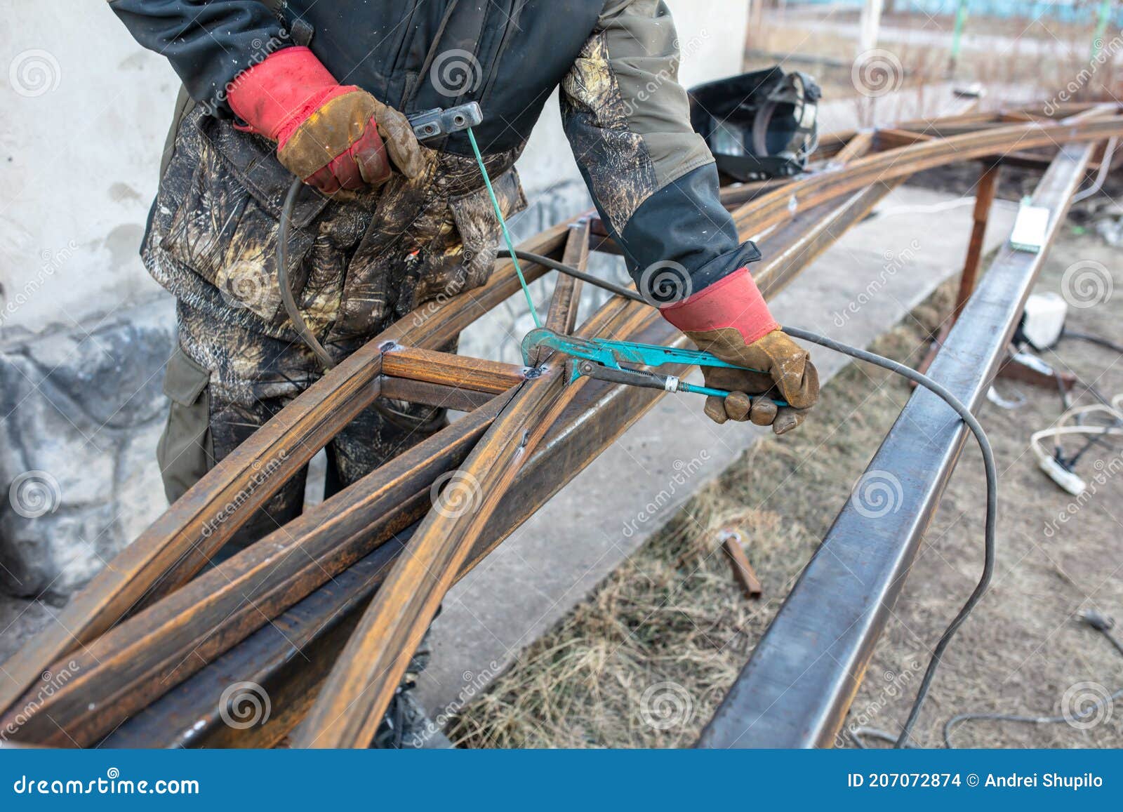 A Worker Welds Metal for a Canopy Stock Photo - Image of labor ...