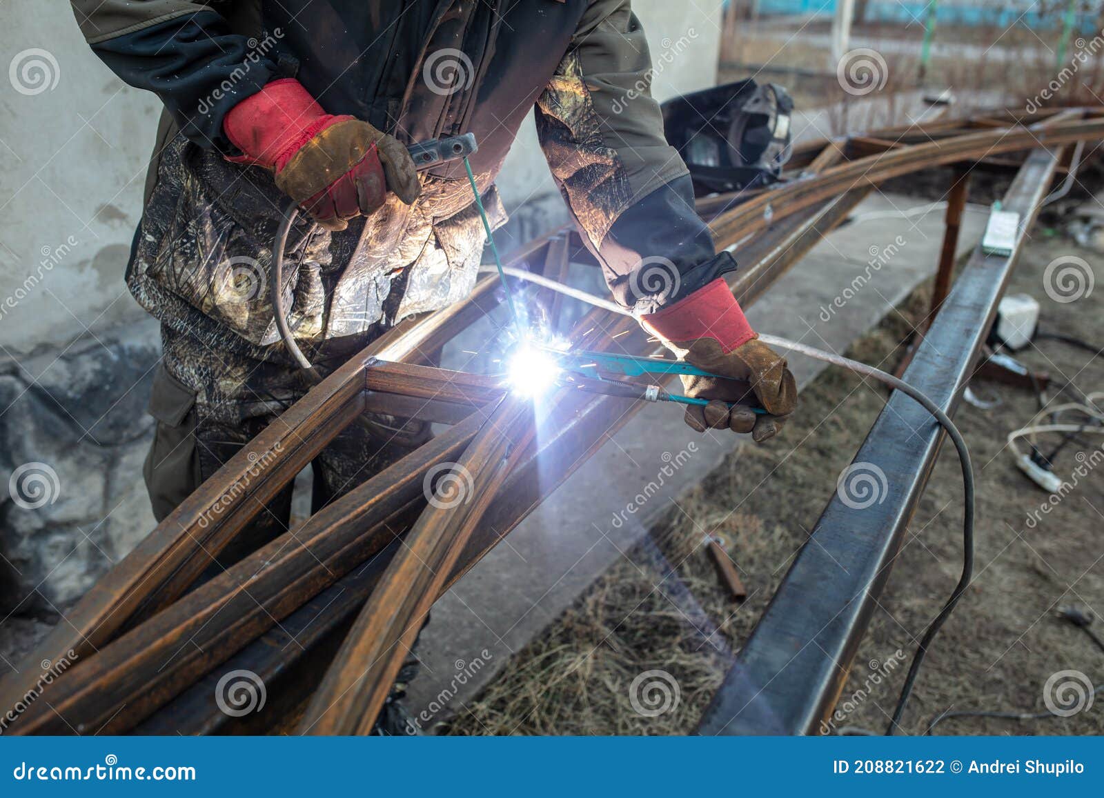 A Worker Welds Metal for a Canopy Stock Photo - Image of welder ...