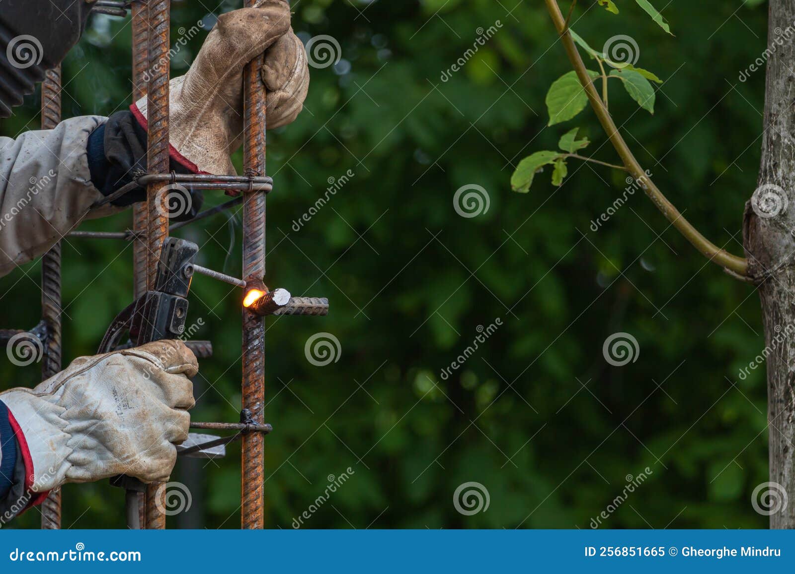 A Worker Welds a Reinforcement - Future Column - Construction Concept ...