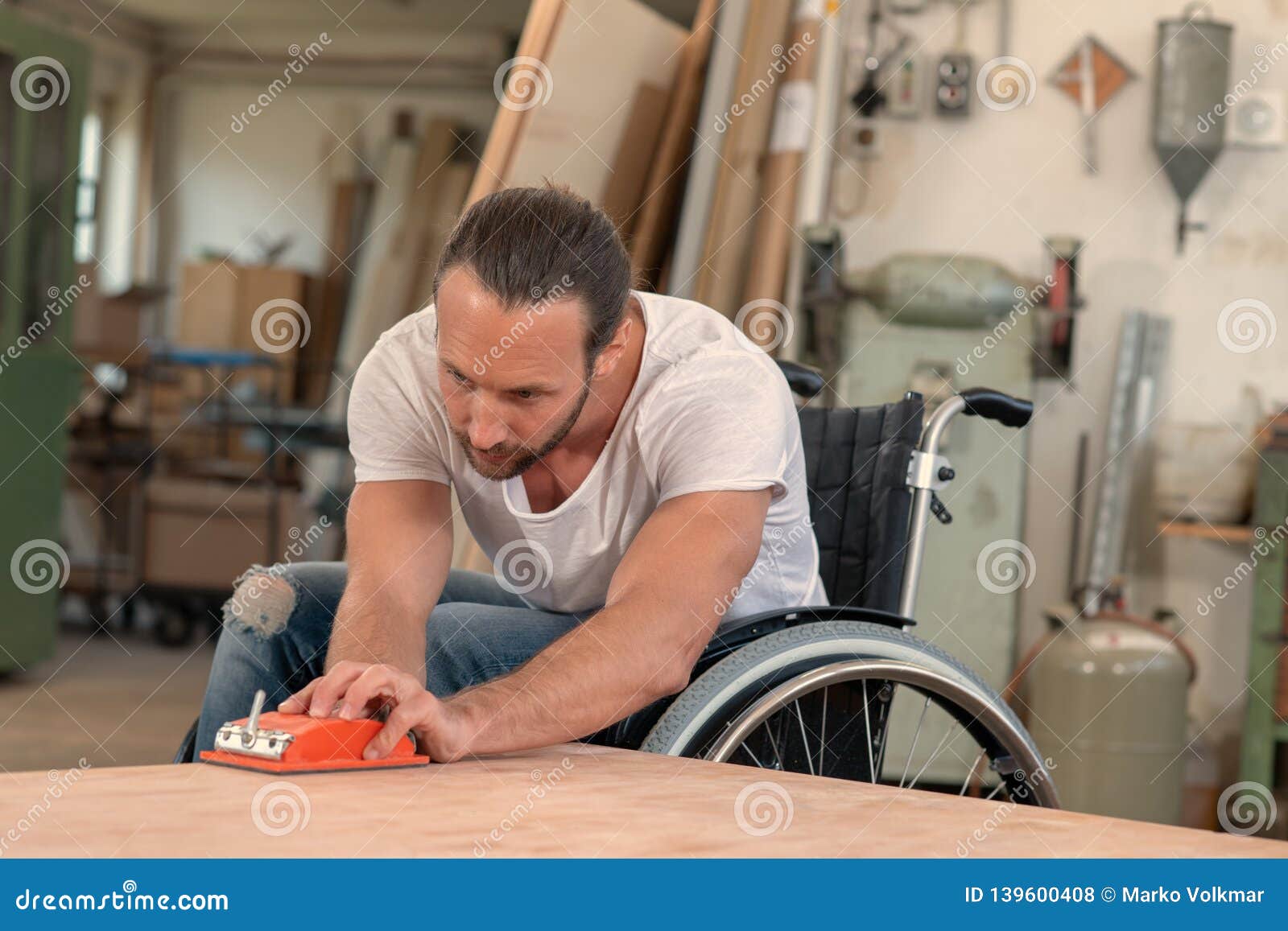 Worker in Wheelchair in a Carpenter`s Workshop Stock Photo - Image of ...