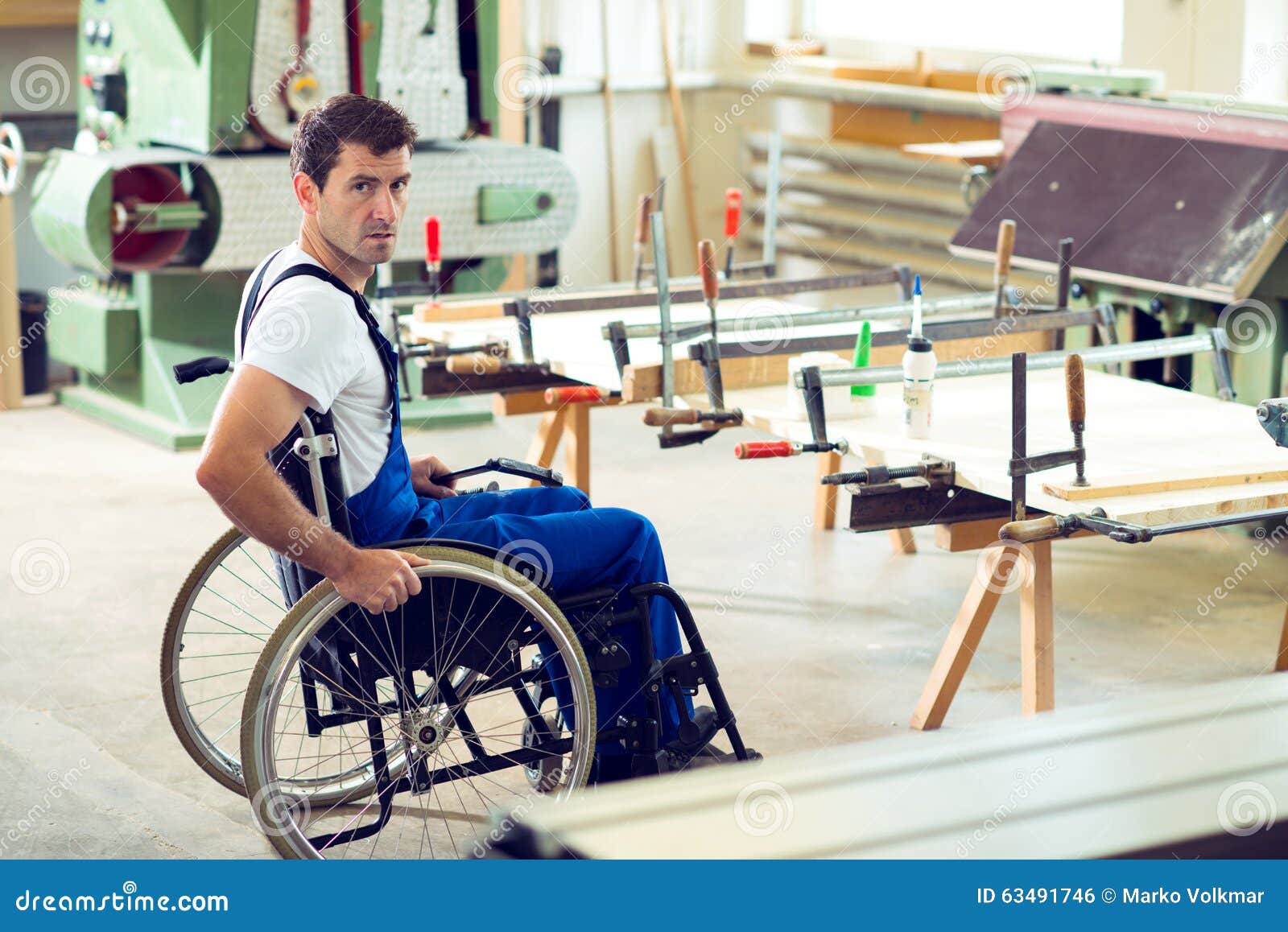 Worker in Wheelchair in a Carpenter S Workshop Stock Photo - Image of ...