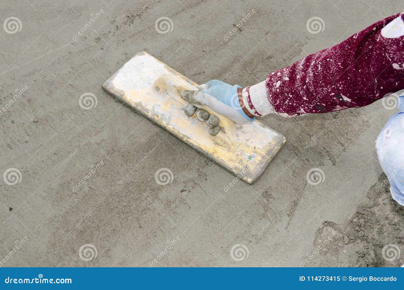 Worker Who Throws Cement on a Building Site Stock Image - Image of ...