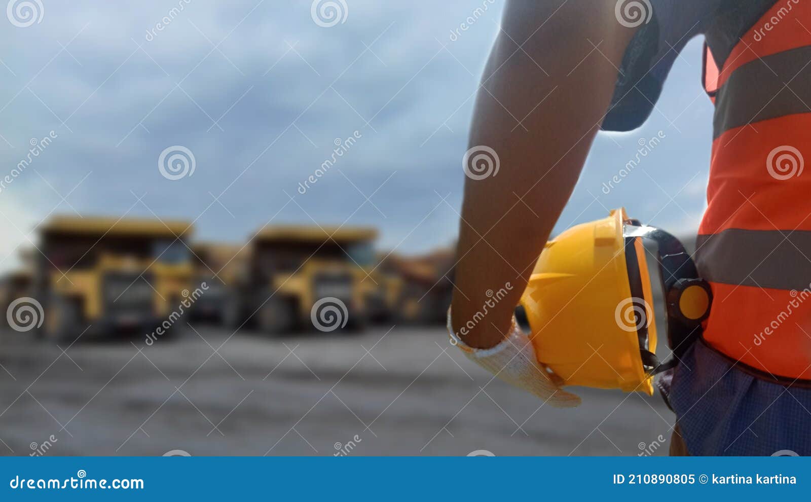 A Worker at Construction Site. he Looking at the Worksite the ...