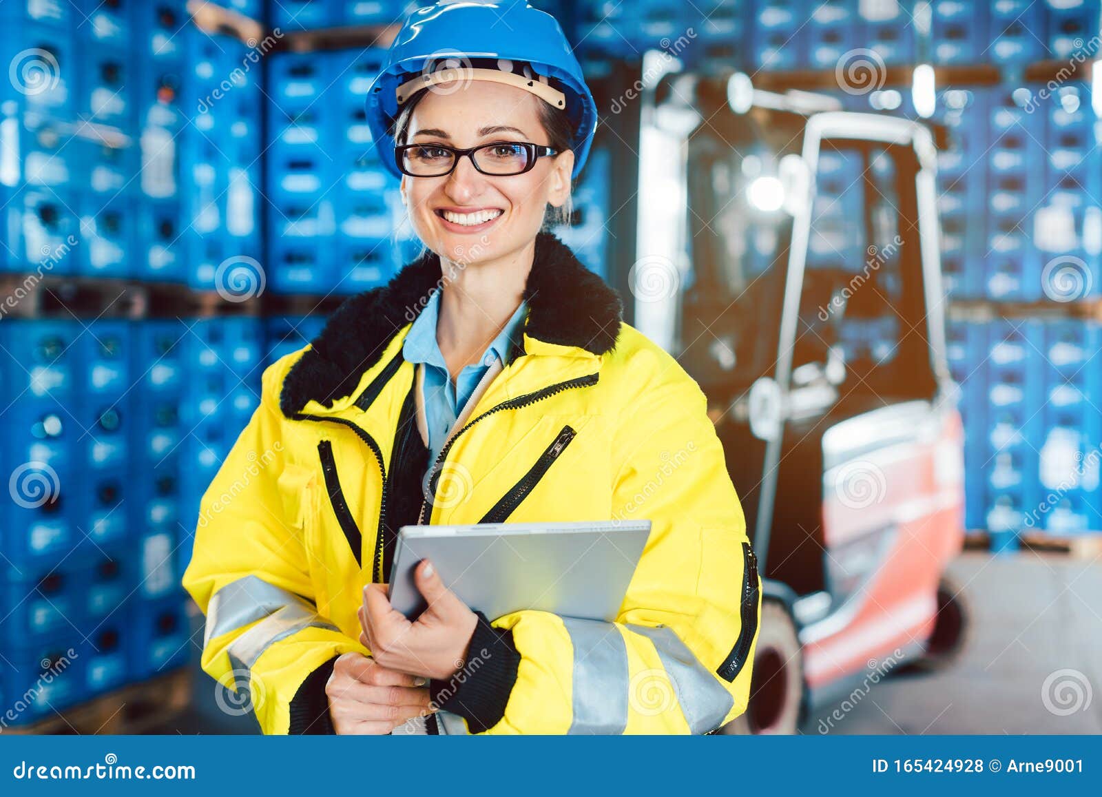 Worker Woman in a Logistics Company with a Tablet Computer Stock Photo ...