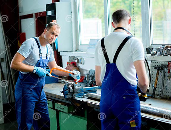 Worker on Work Bench in the Factory Stock Image - Image of industry ...