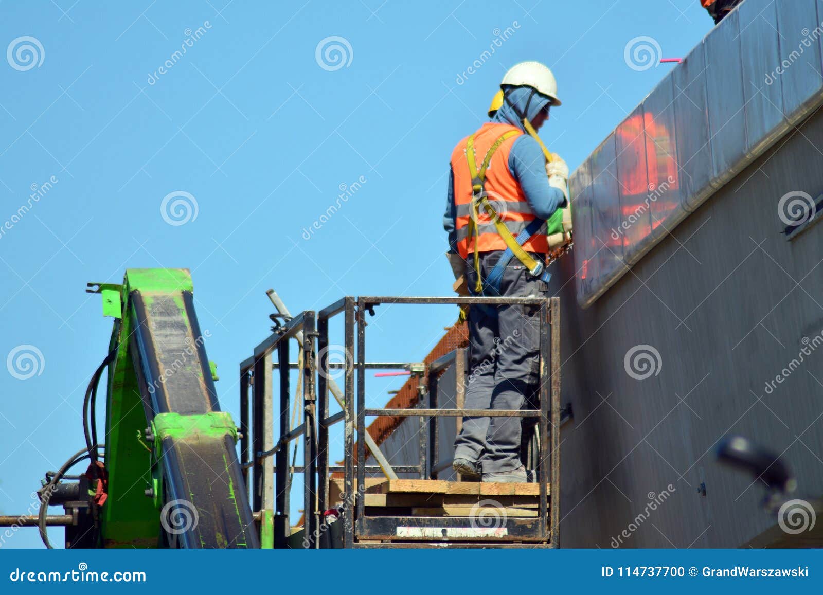 Construction Workers on a Scaffold. Stock Photo - Image of light ...