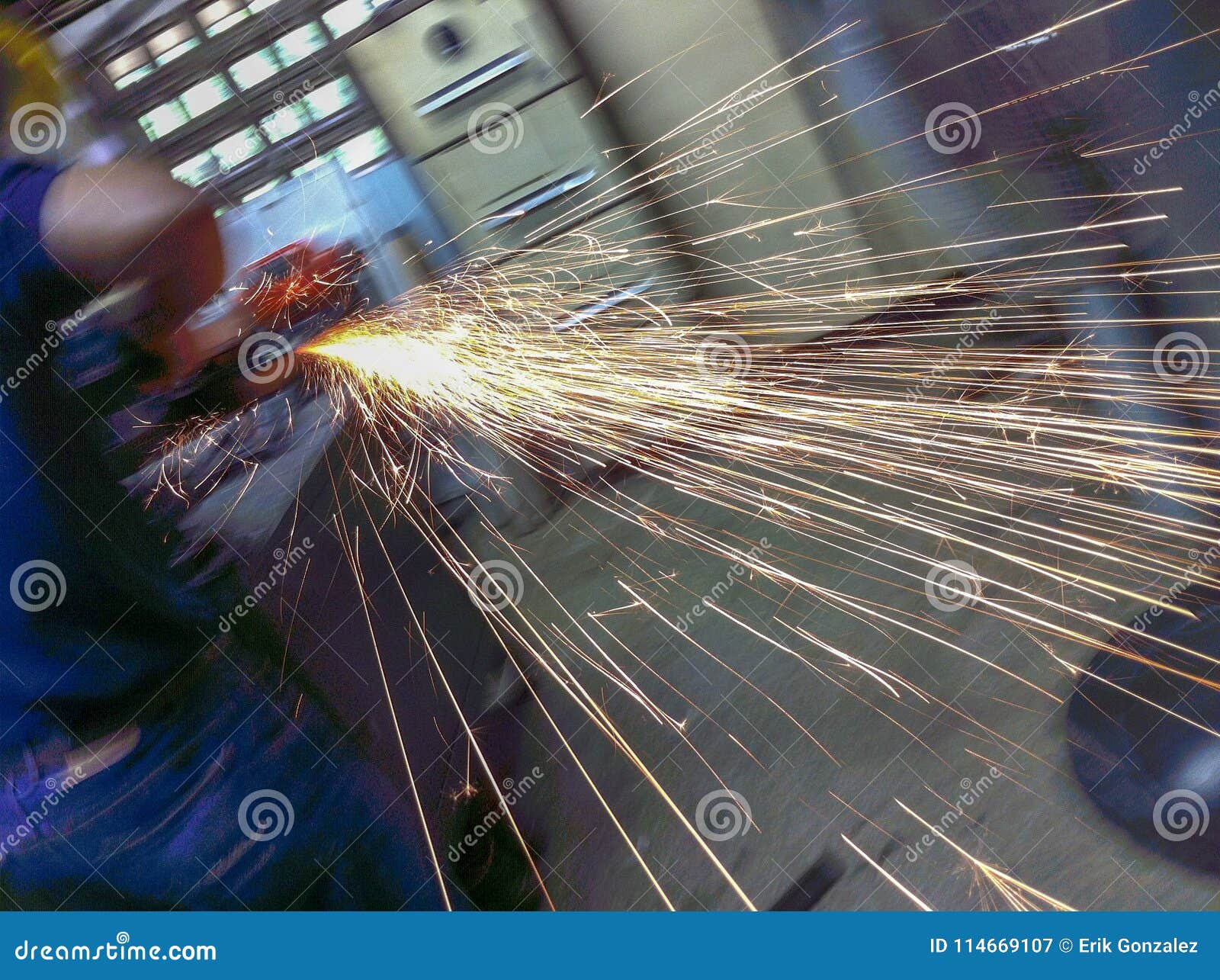 Worker Performing Grinding Work Stock Image - Image of light, disk ...
