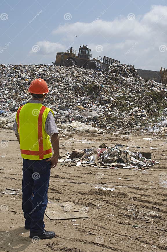 Worker Working at Landfill Site Stock Photo - Image of disposal, helmet ...
