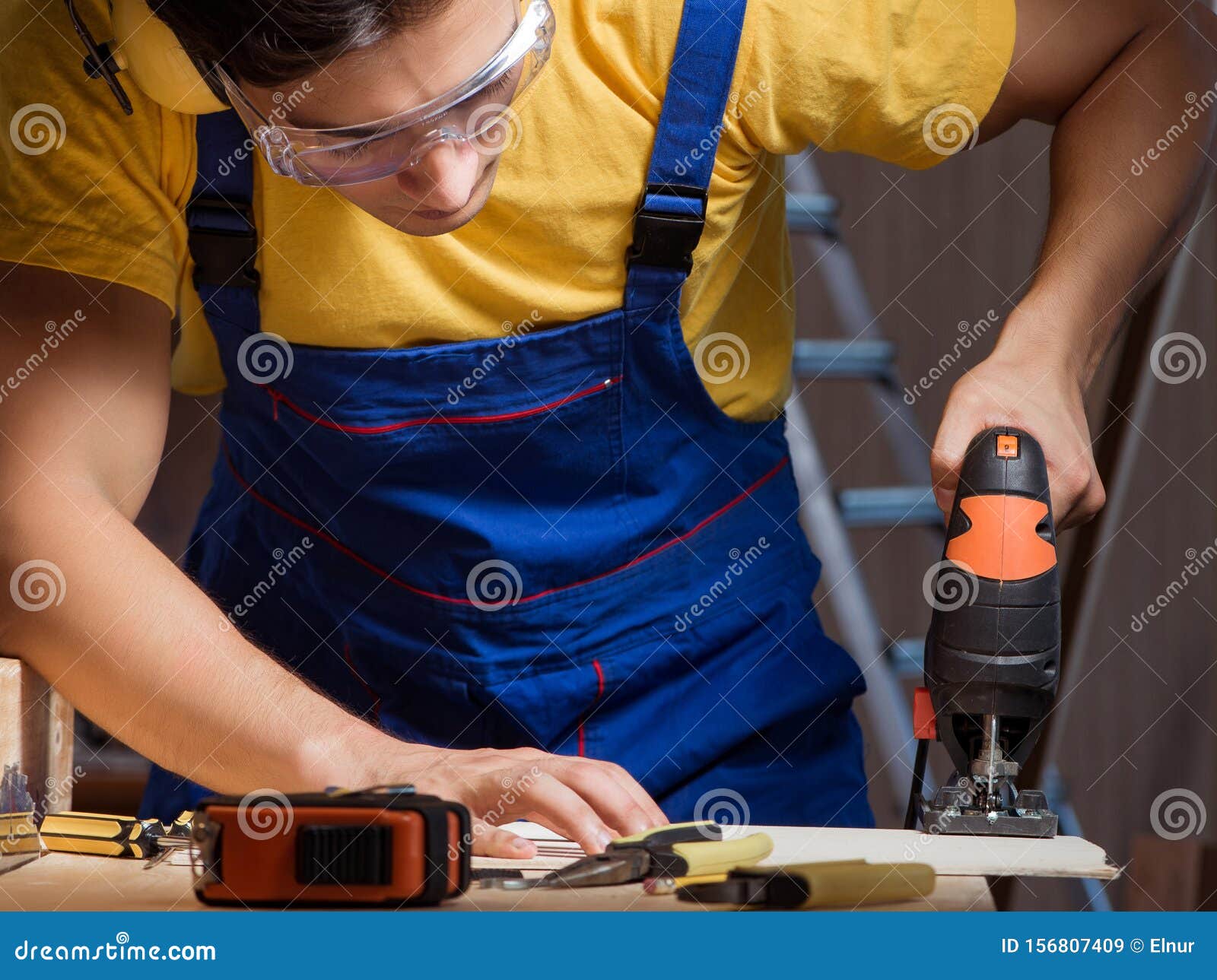 Worker Working in Repair Workshop in Woodworking Concept Stock Image ...