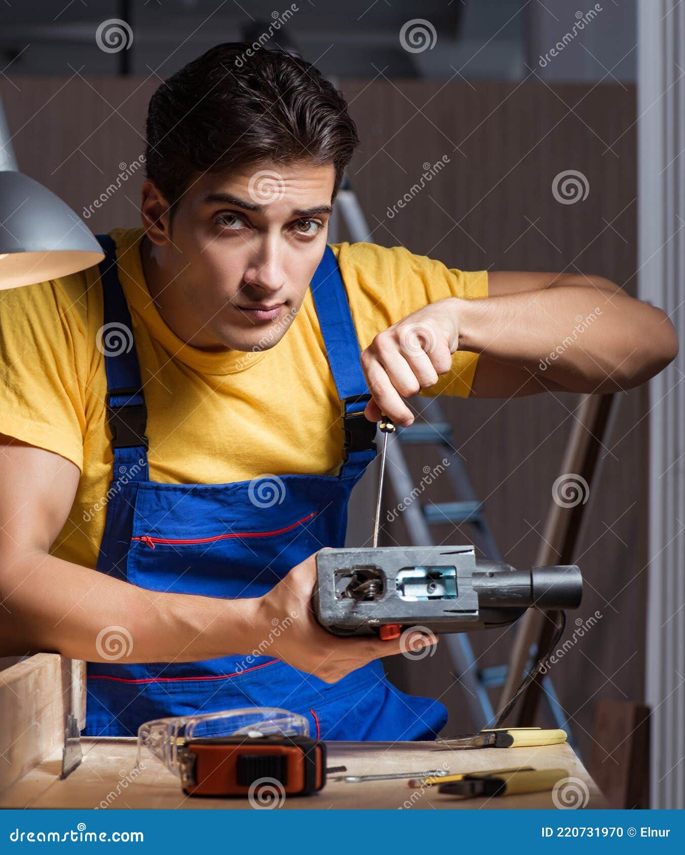 Worker Working in Repair Workshop in Woodworking Concept Stock Photo ...