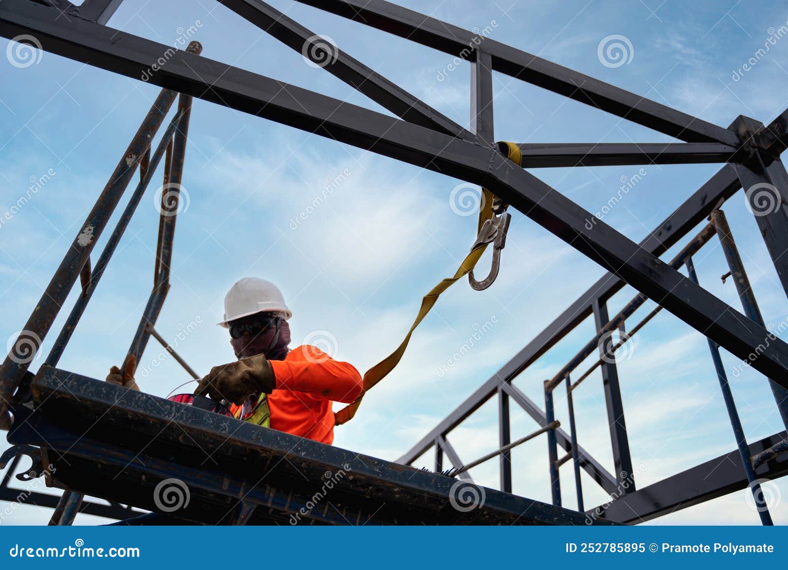 A Worker are Working on the Structure of the Building with Fall ...