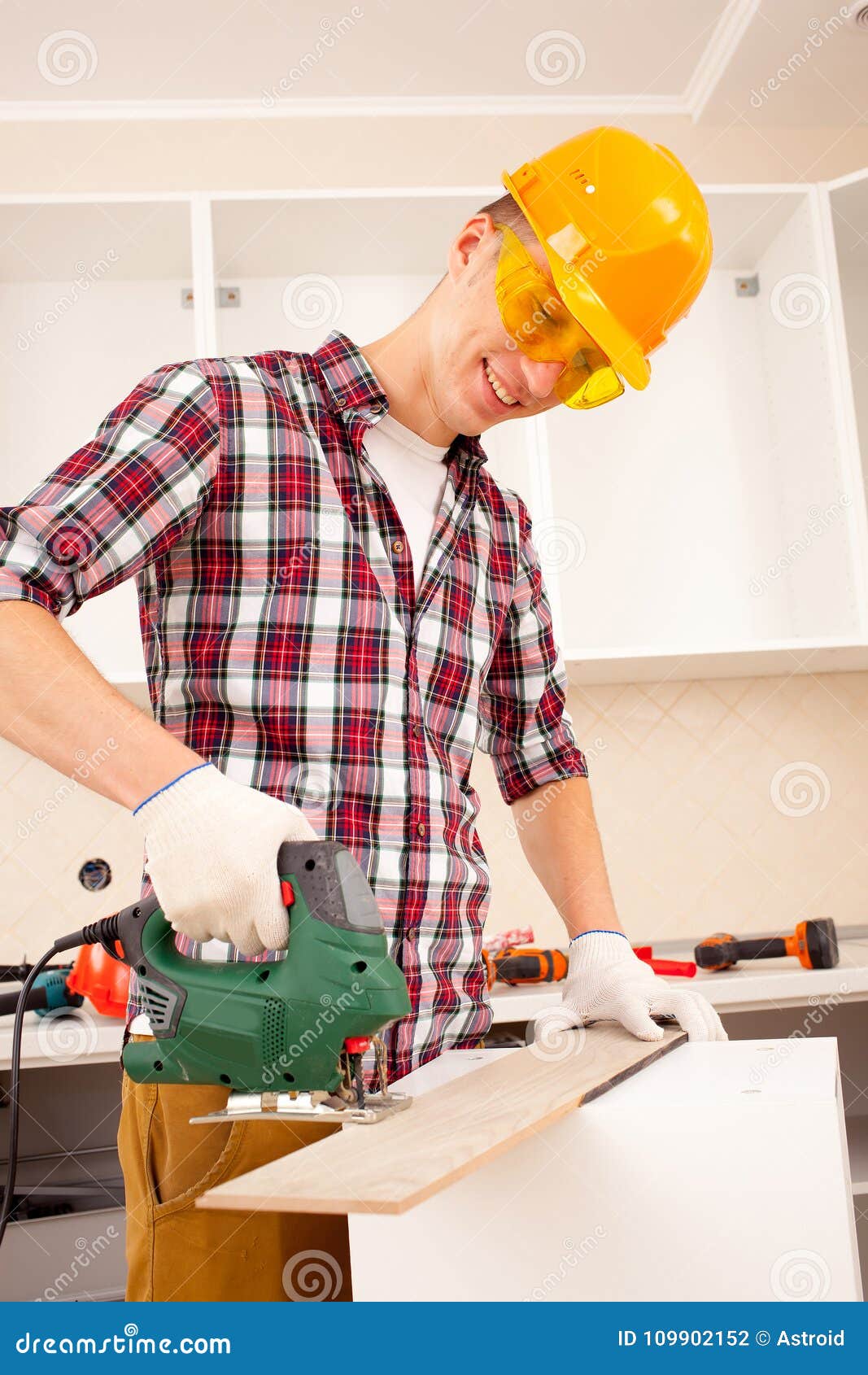 Worker works jigsaw stock photo. Image of carpenter - 109902152