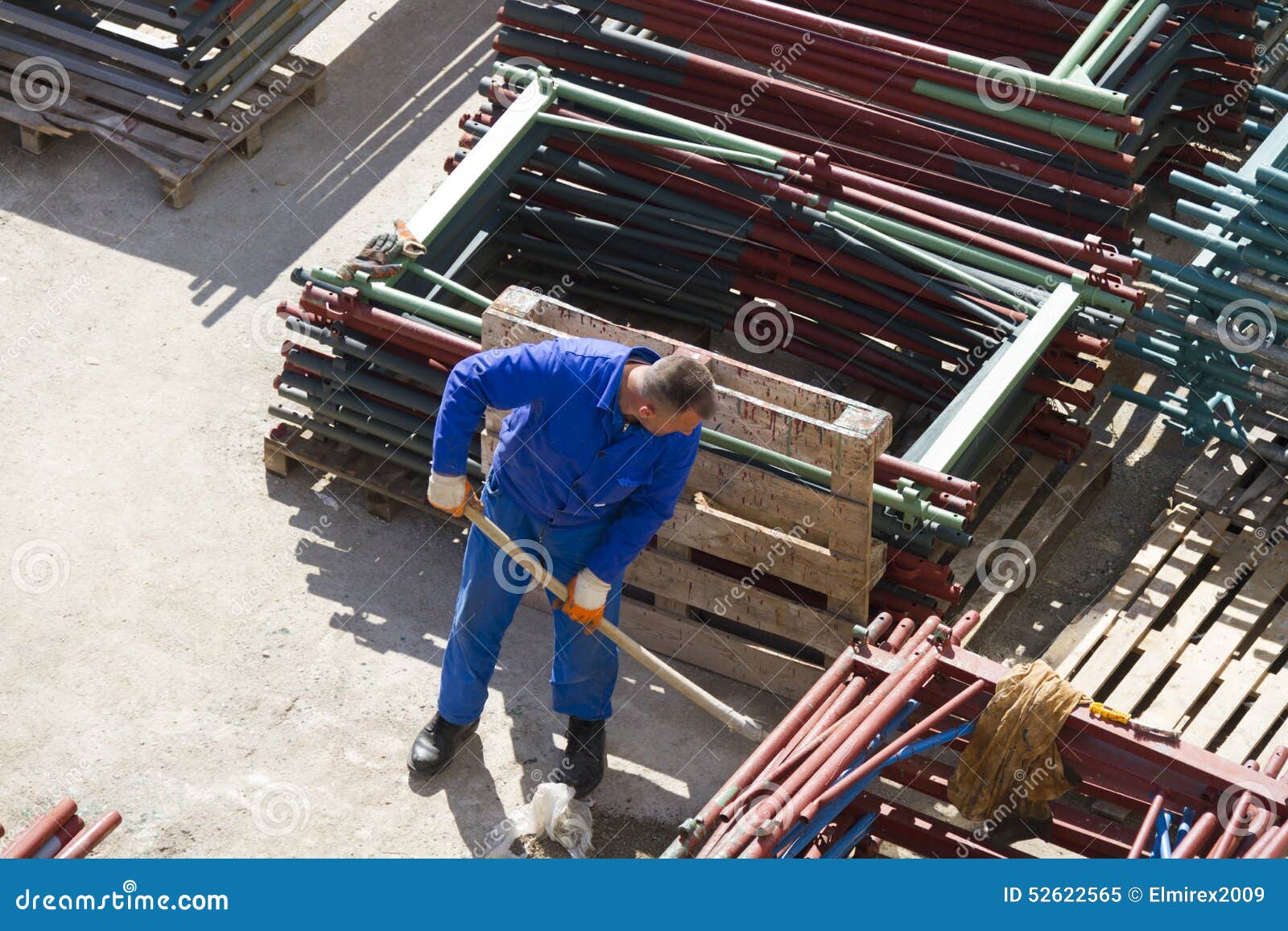 Worker Works with a Shovel, Cleaning Rubble Stock Image - Image of ...