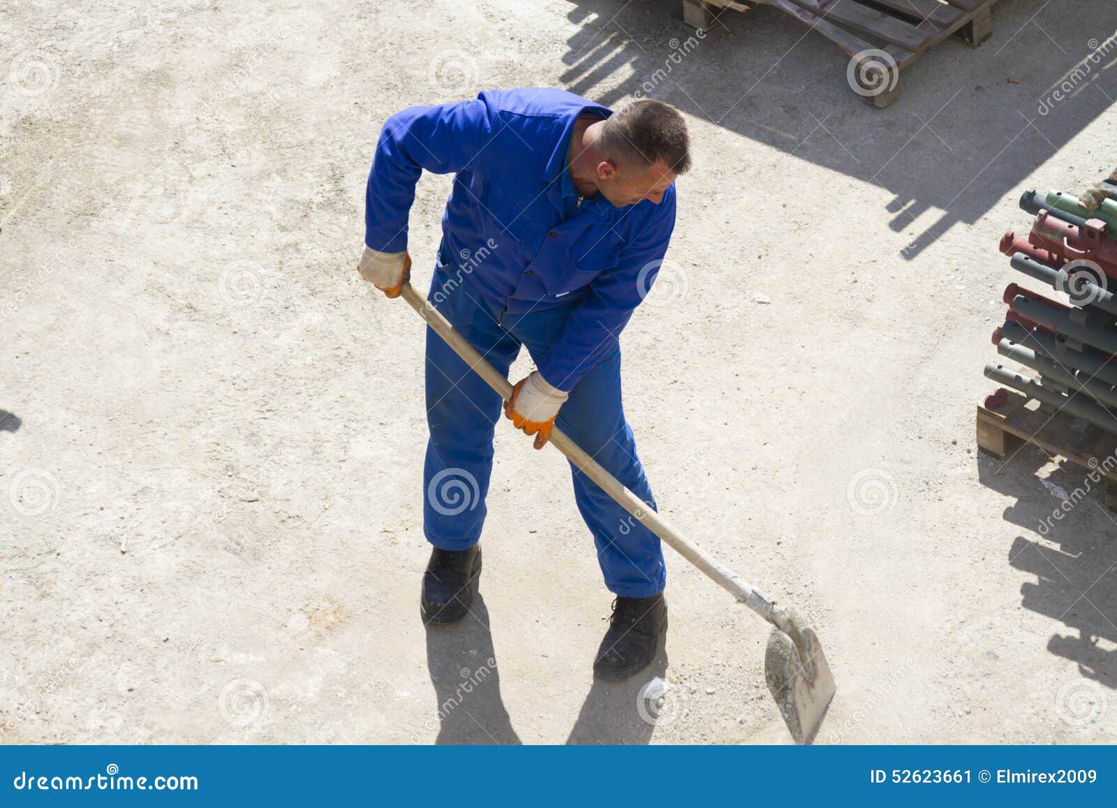 Worker Works with a Shovel, Cleaning Rubble Stock Image - Image of ...