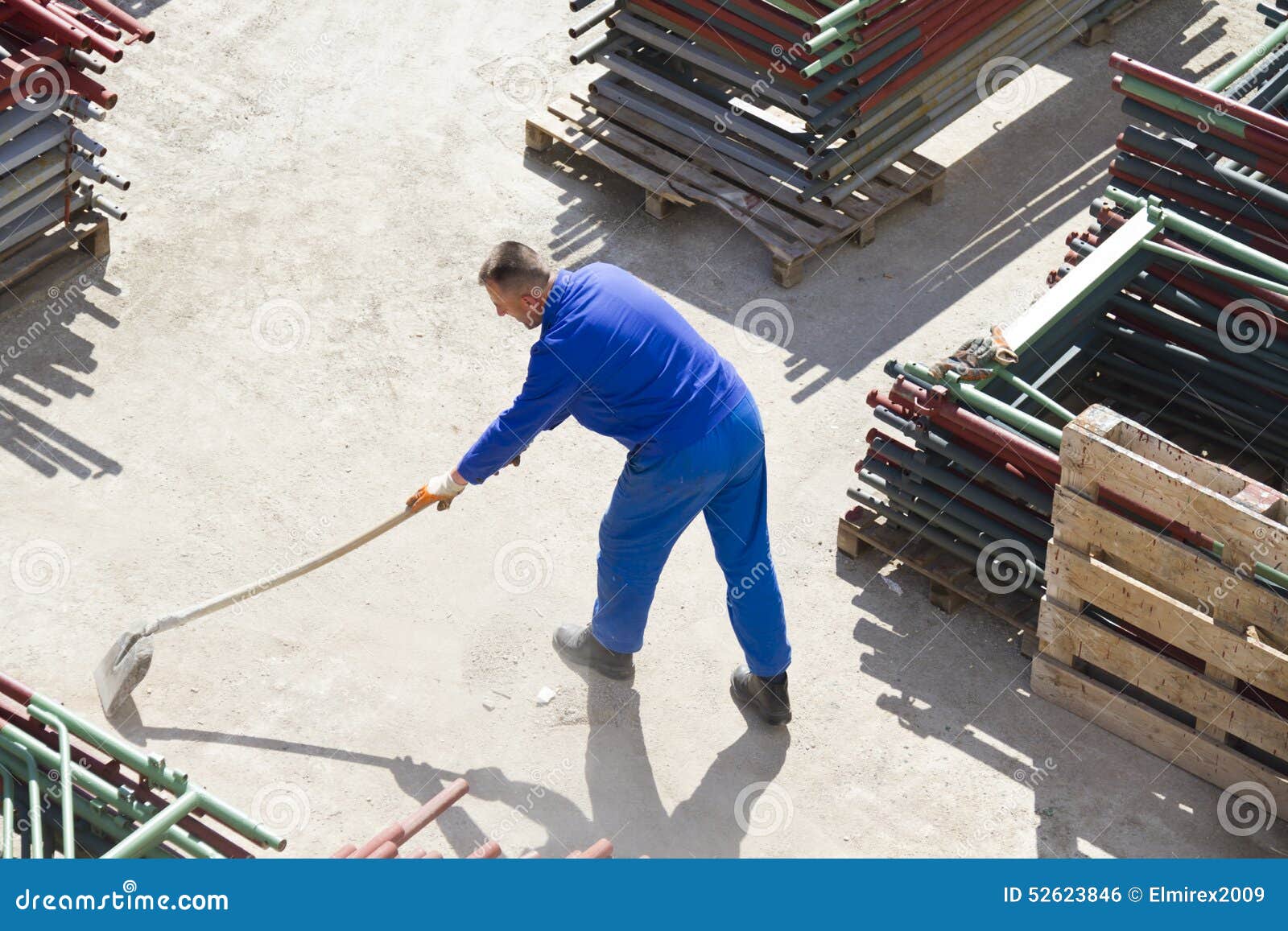 Worker Works with a Shovel, Cleaning Rubble Stock Photo - Image of ...