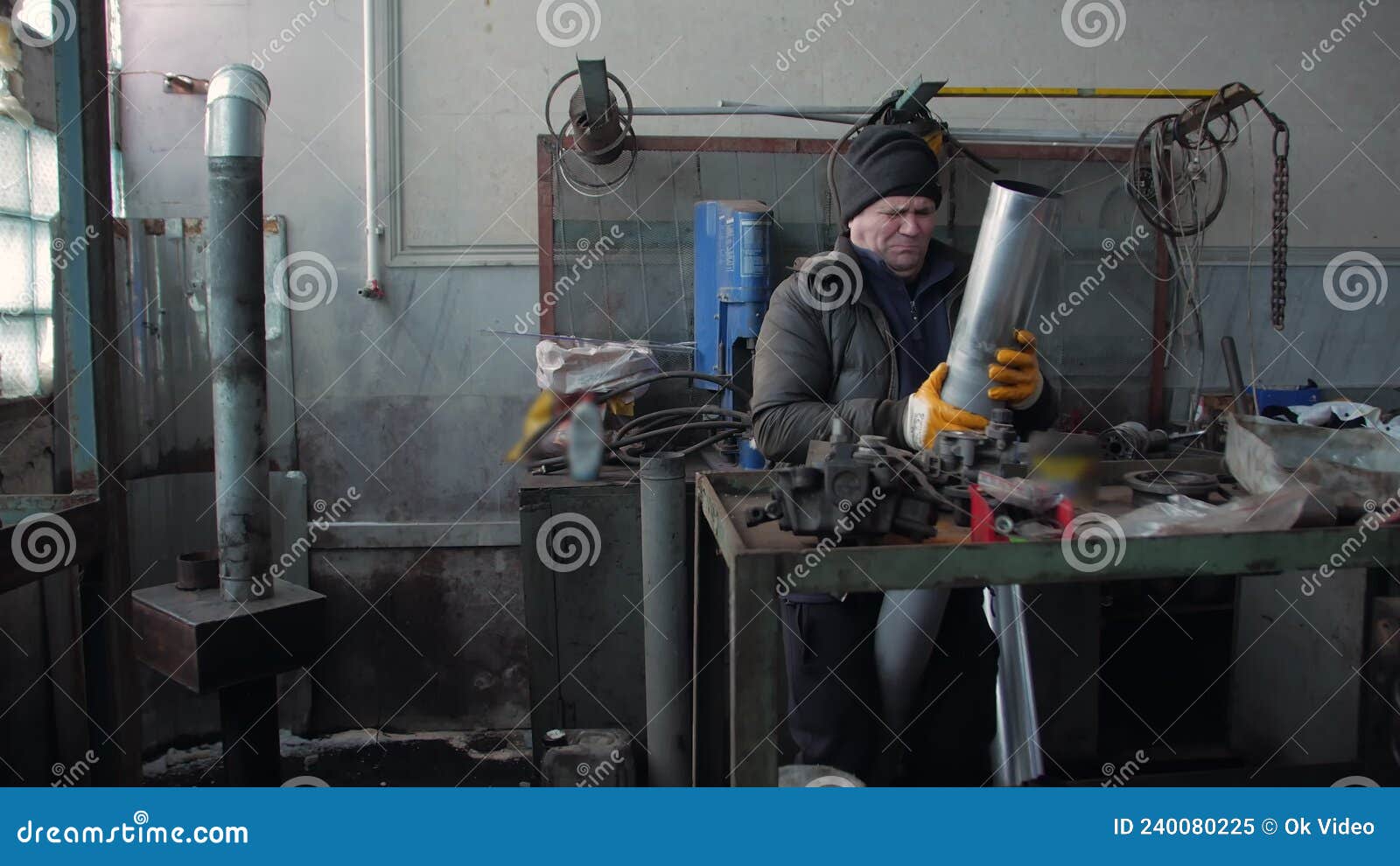 Worker in a Workshop with a Pipe Stock Video - Video of production ...