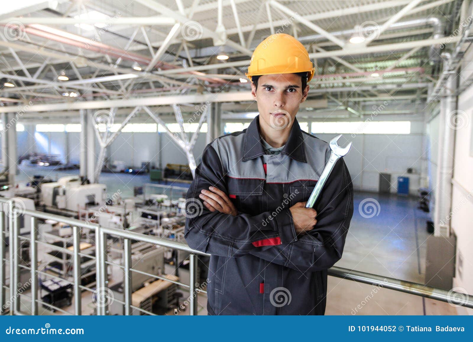 Worker with Wrench at CNC Factory Stock Photo - Image of factory ...