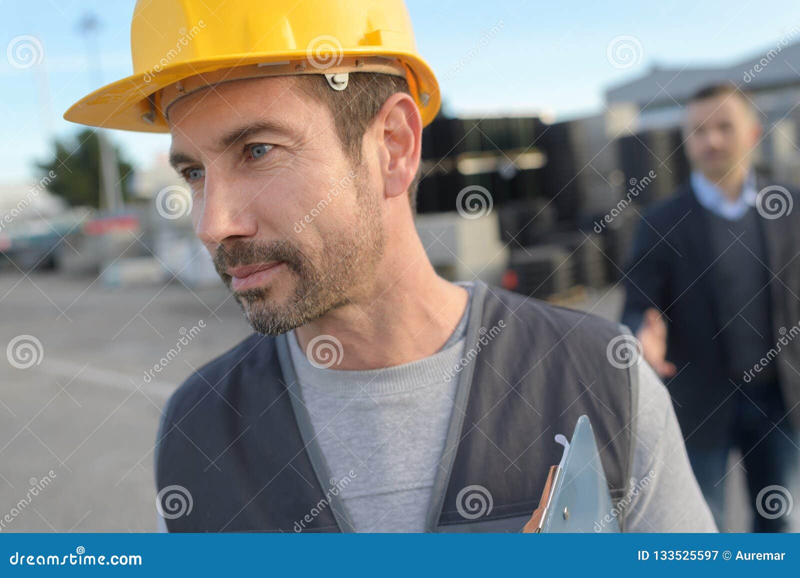 Worker with yellow helmet stock image. Image of outside - 133525597