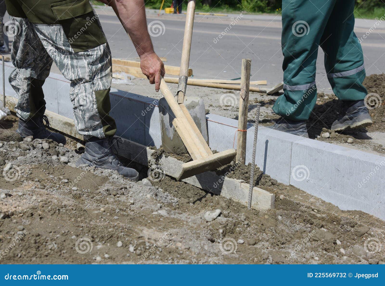 Workers Align the Cement Near the Installed Curbs. Stock Photo - Image ...