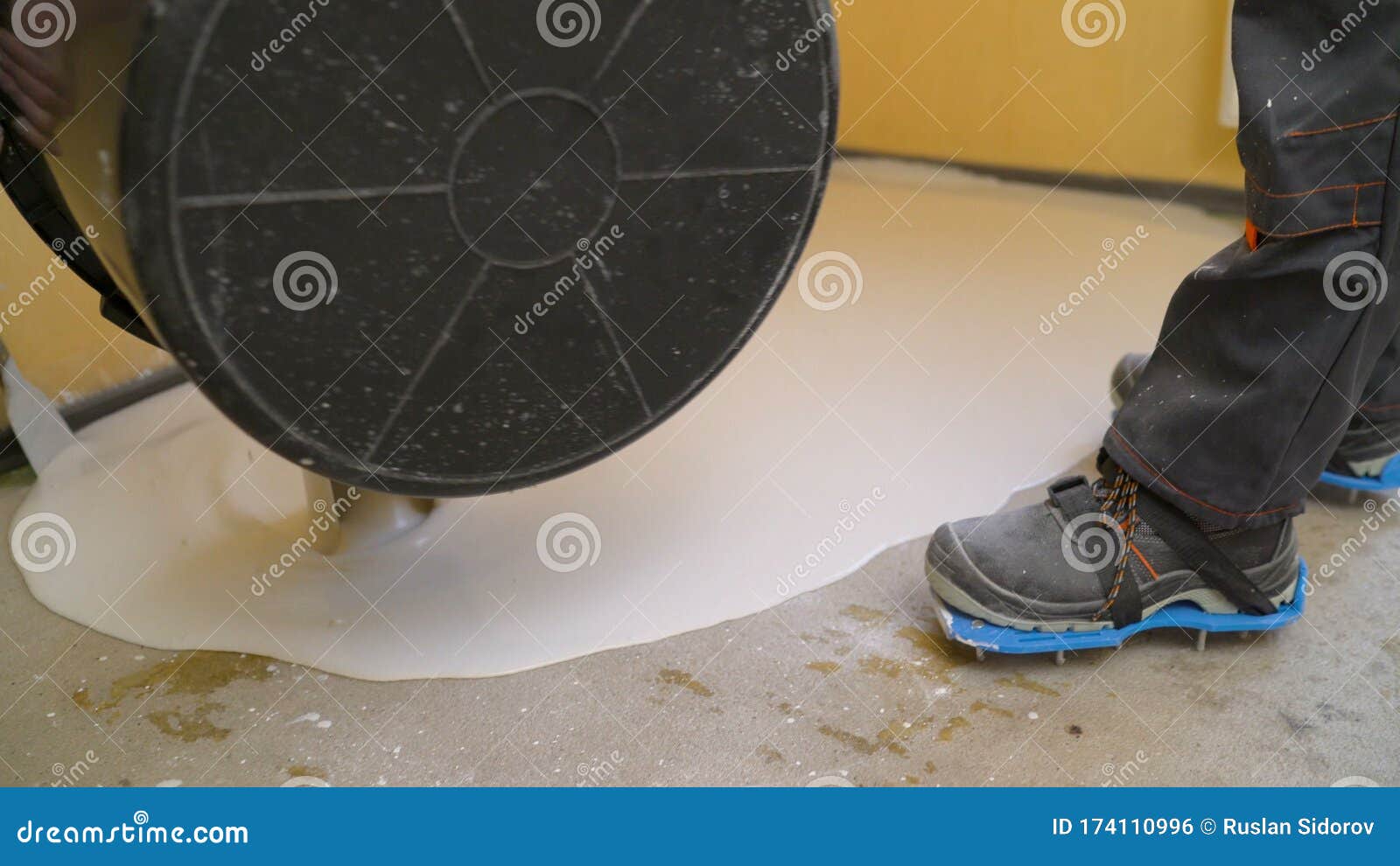 Workers Flood the Floor. Industrial Worker at a Cement Waterproofing ...