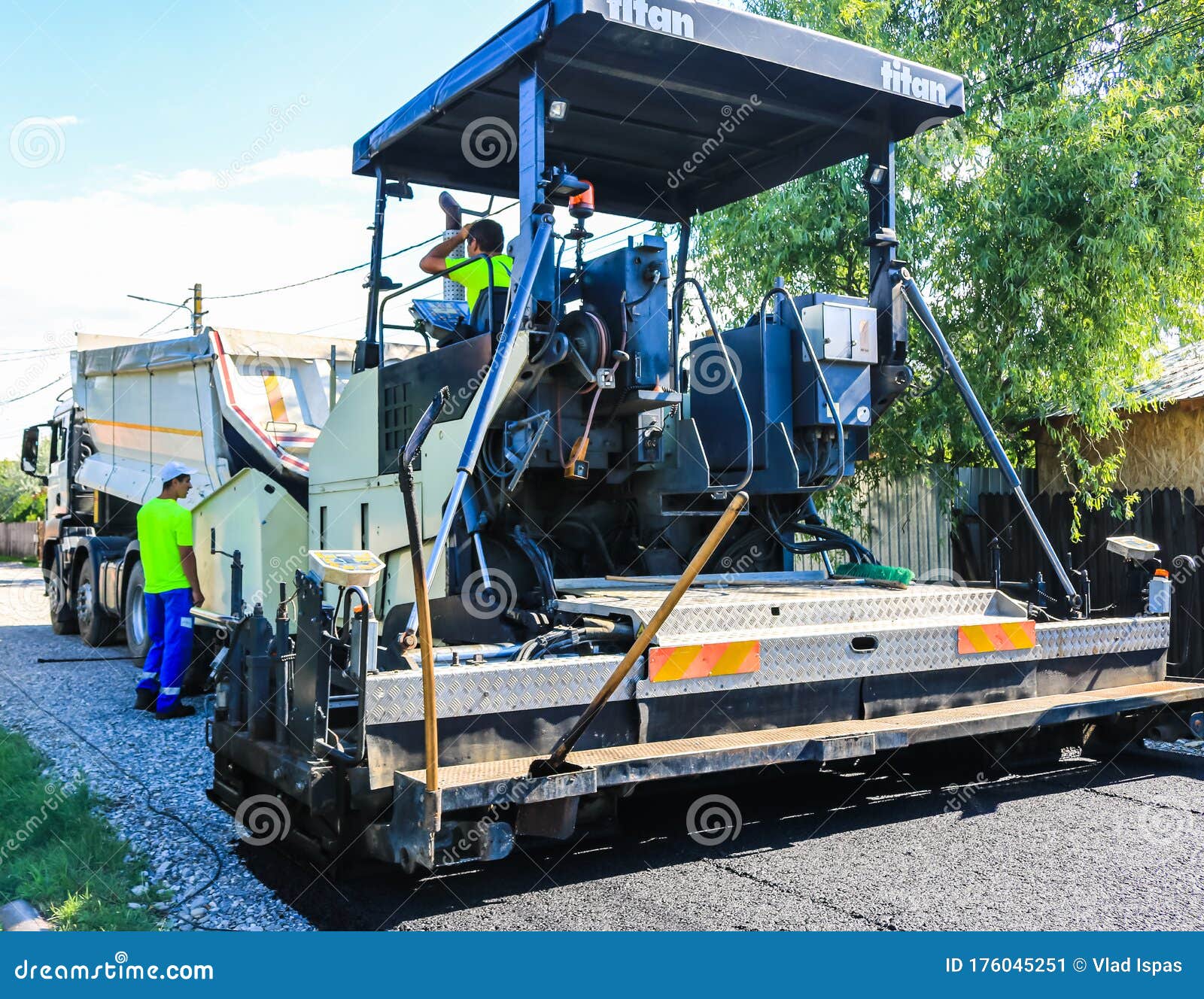 Workers and Asphalting Machines. Construction, Asphalting of New Road ...