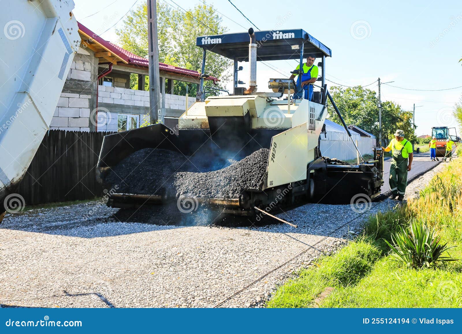 Workers and Asphalting Machines. Construction, Asphalting of New Road ...