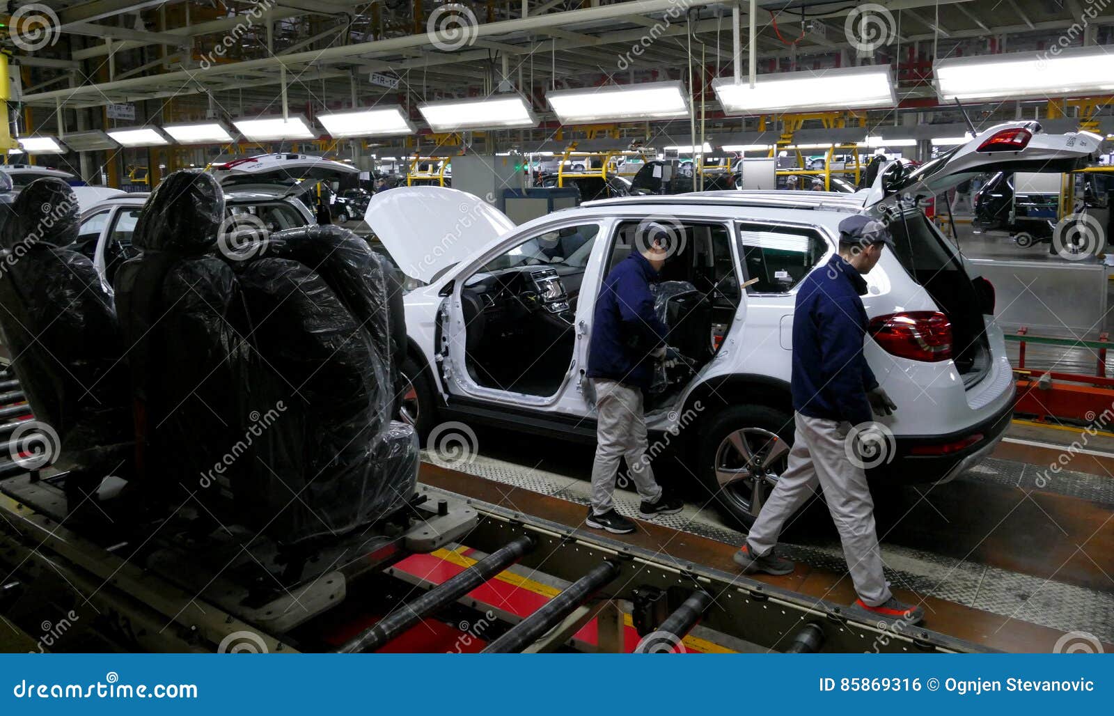 Workers Assemble a Car on Assembly Line in Car Factory Editorial Photo ... Workers Assemble a Car on Assembly Line in Car Factory Editorial Photo ...