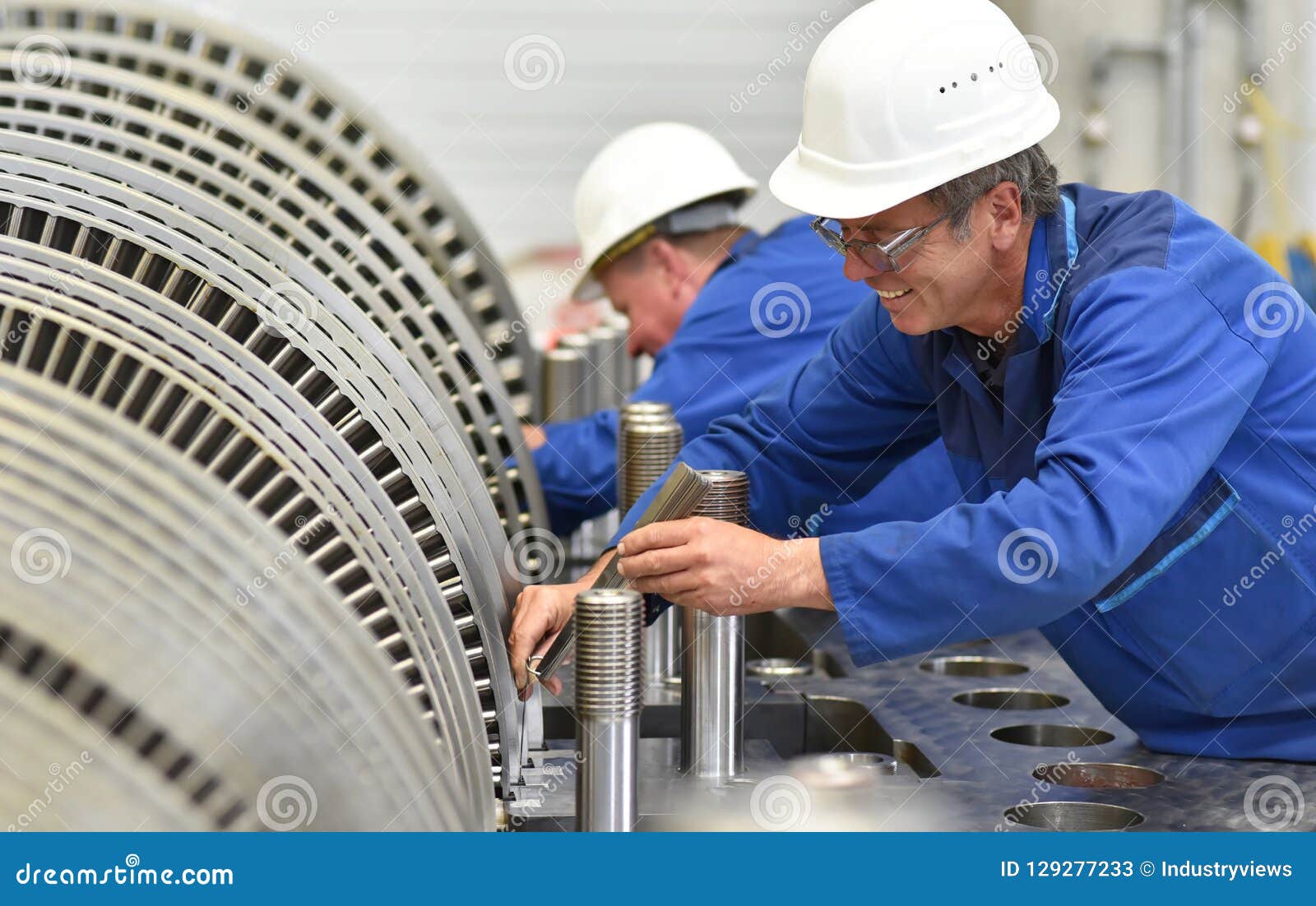Workers Assembling and Quality Control of Gas Turbines in a Mode Stock ...