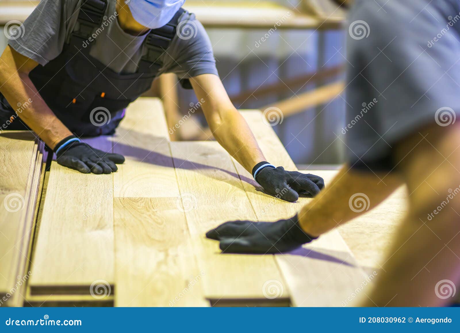 Workers Assembling Wooden Flooring Together in Factory Stock Photo ...