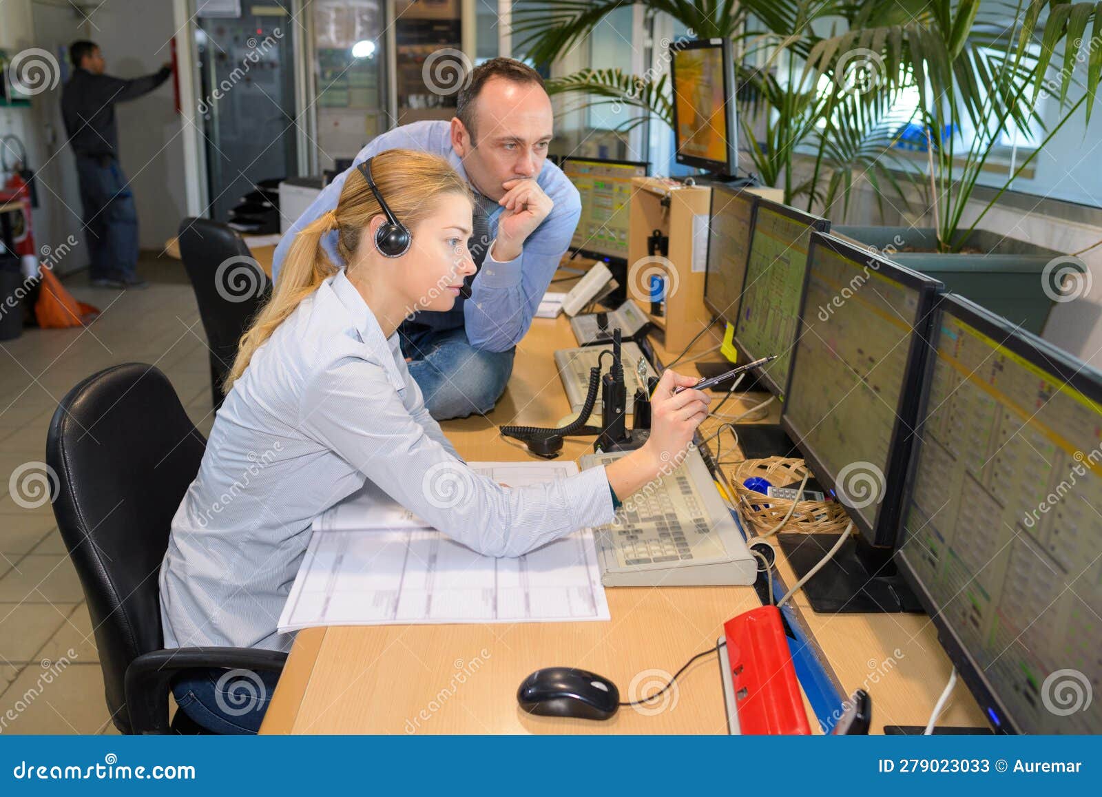 Workers Assessing Information in Computer Control Station Stock Image ...