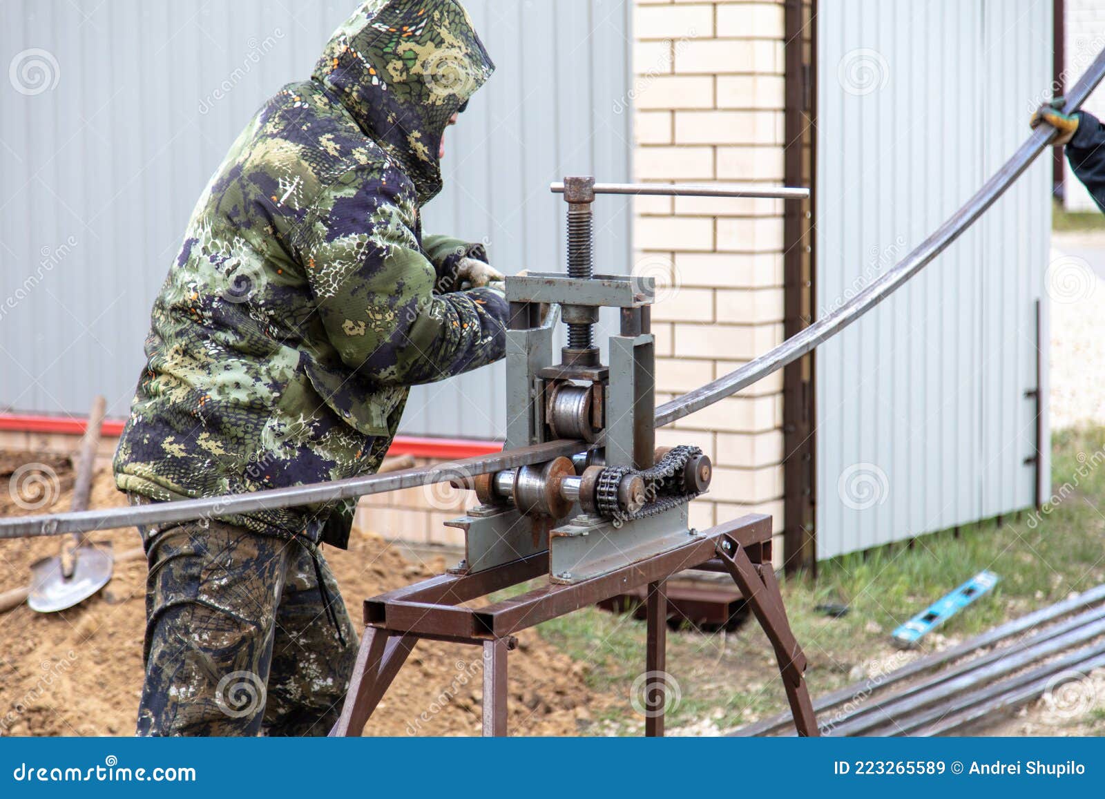 Workers Bend Metal in a Pipe Bender. Stock Image - Image of iron ...