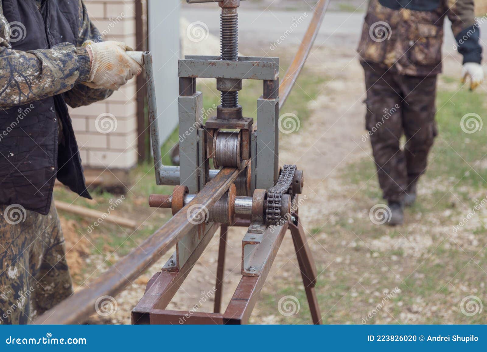Workers Bend Metal in a Pipe Bender. Stock Photo - Image of technology ...
