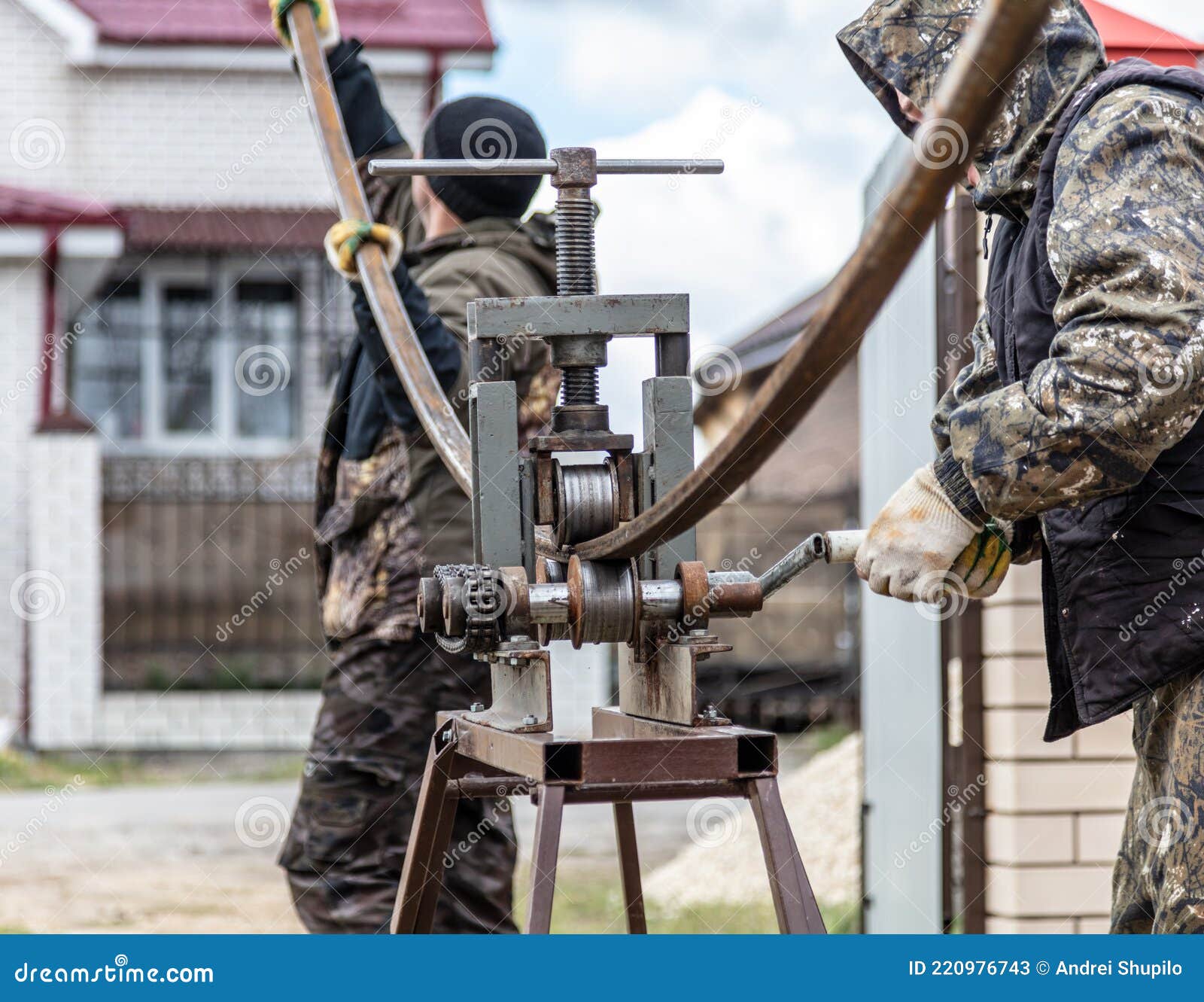 Workers Bend Metal in a Pipe Bender. Stock Image - Image of bender ...