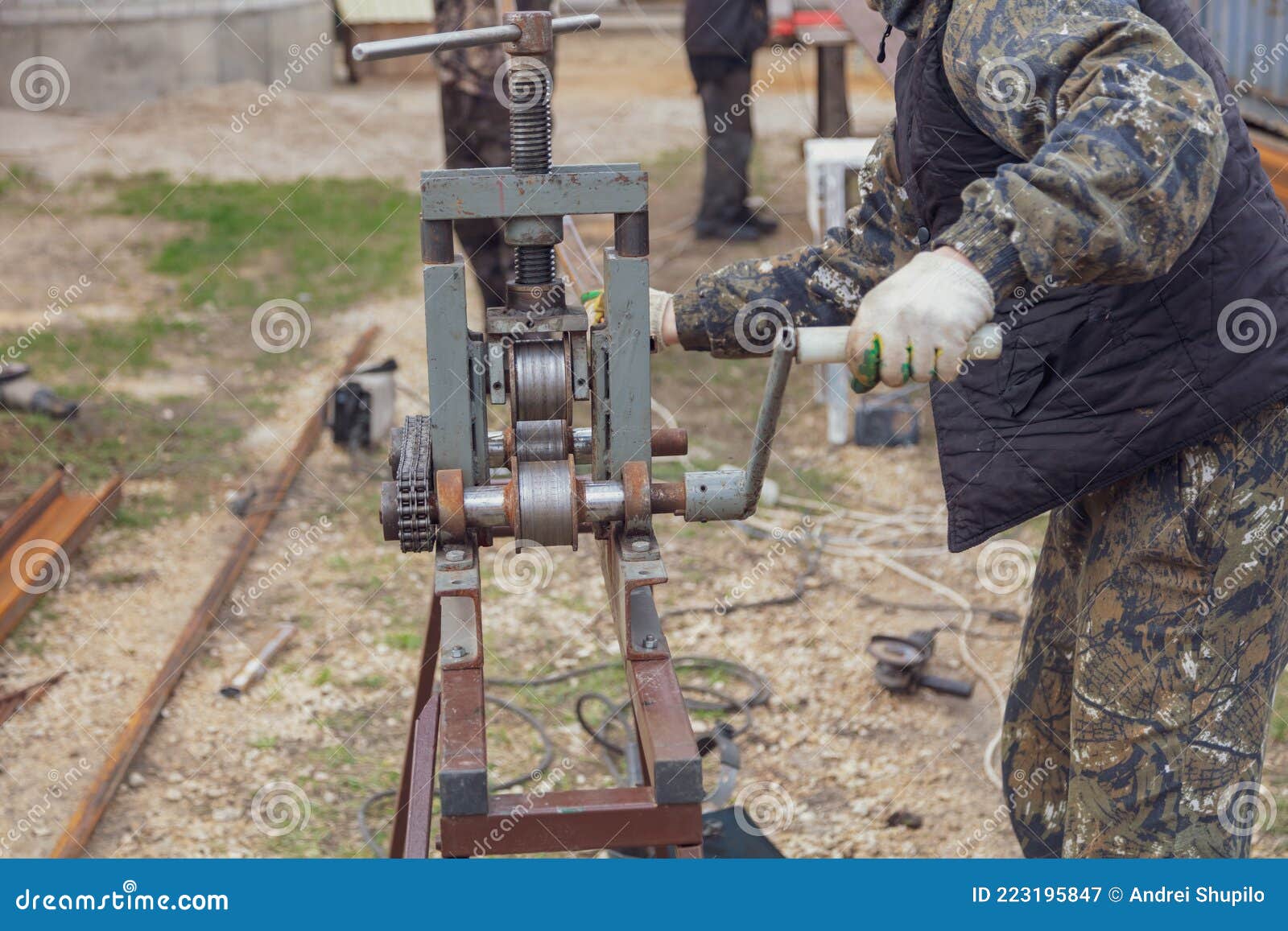 Workers Bend Metal in a Pipe Bender. Stock Image - Image of ...
