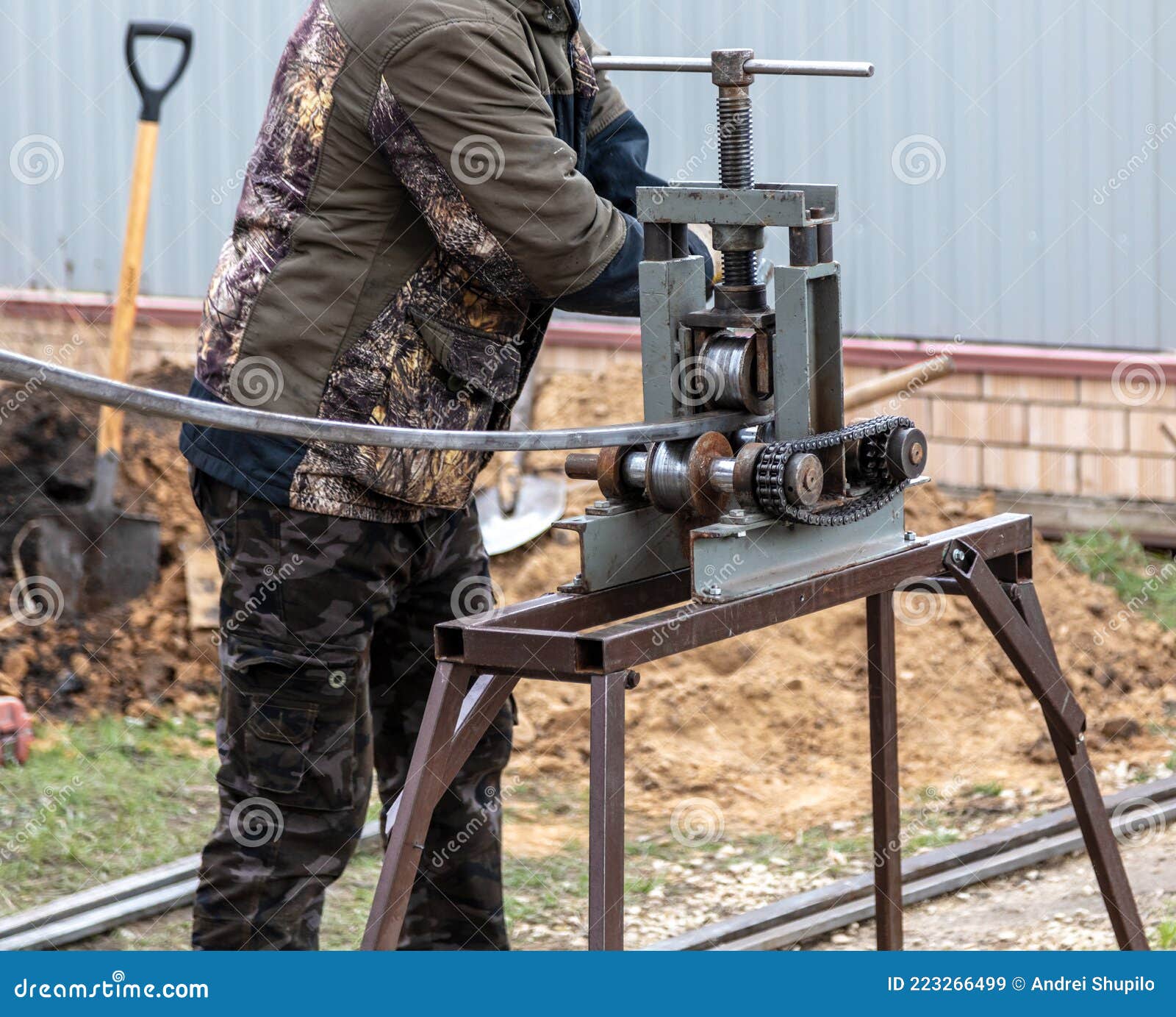 Workers Bend Metal in a Pipe Bender. Stock Image - Image of work, metal ...
