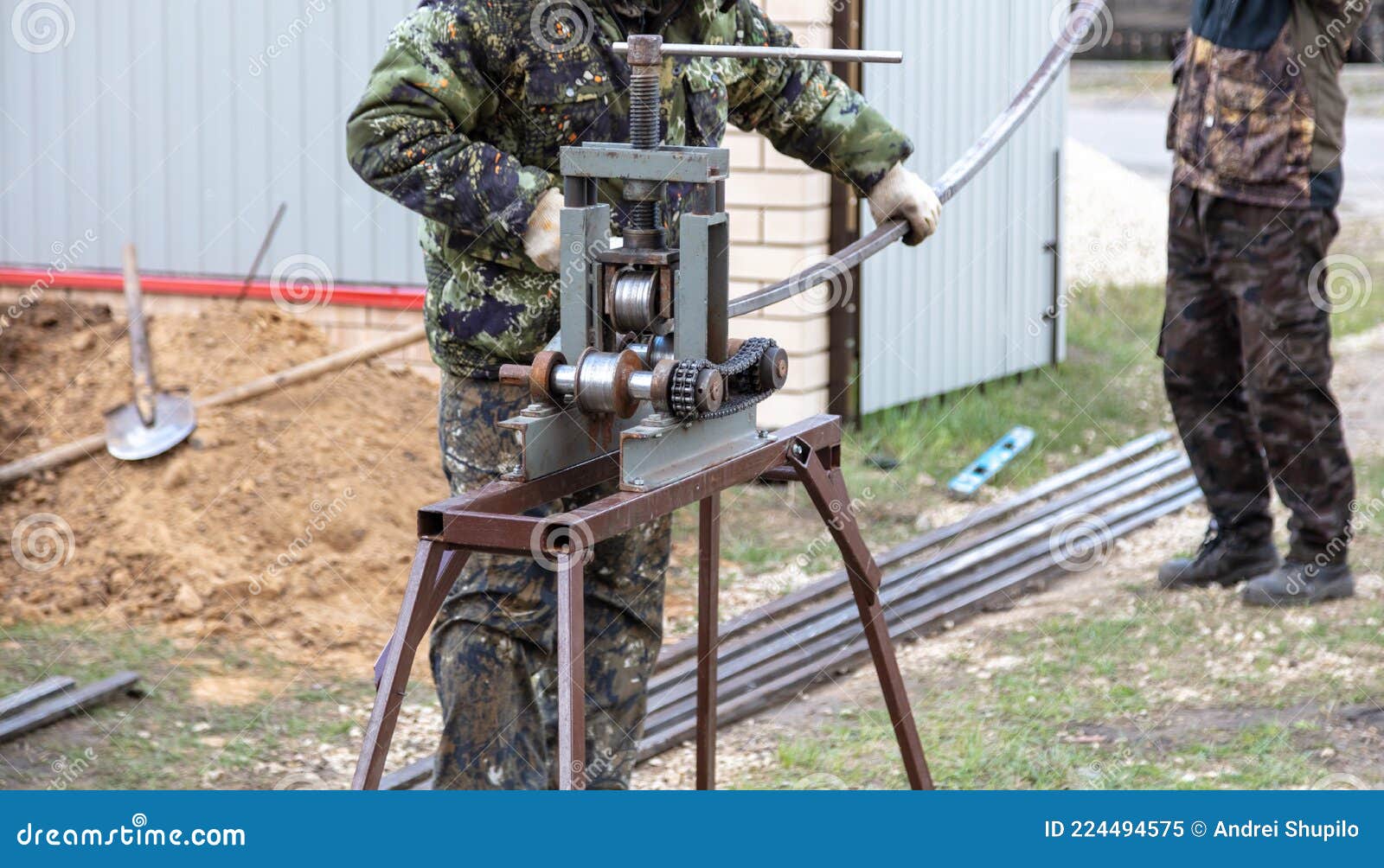 Workers Bend Metal in a Pipe Bender. Stock Image - Image of equipment ...