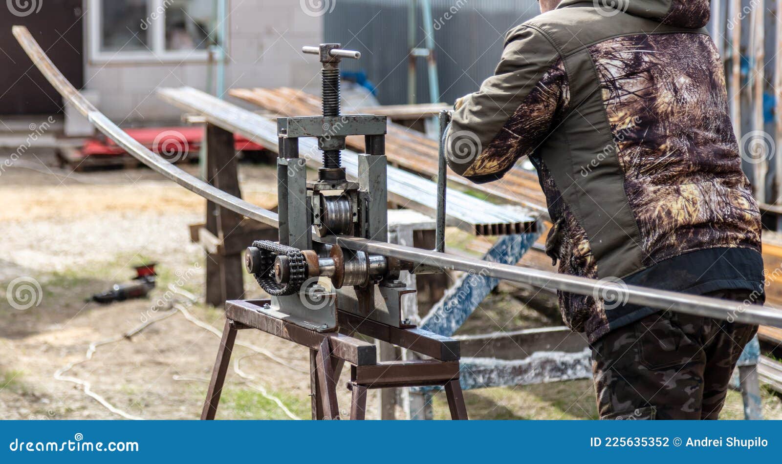 Workers Bend Metal in a Pipe Bender. Stock Photo - Image of pipe, steel ...