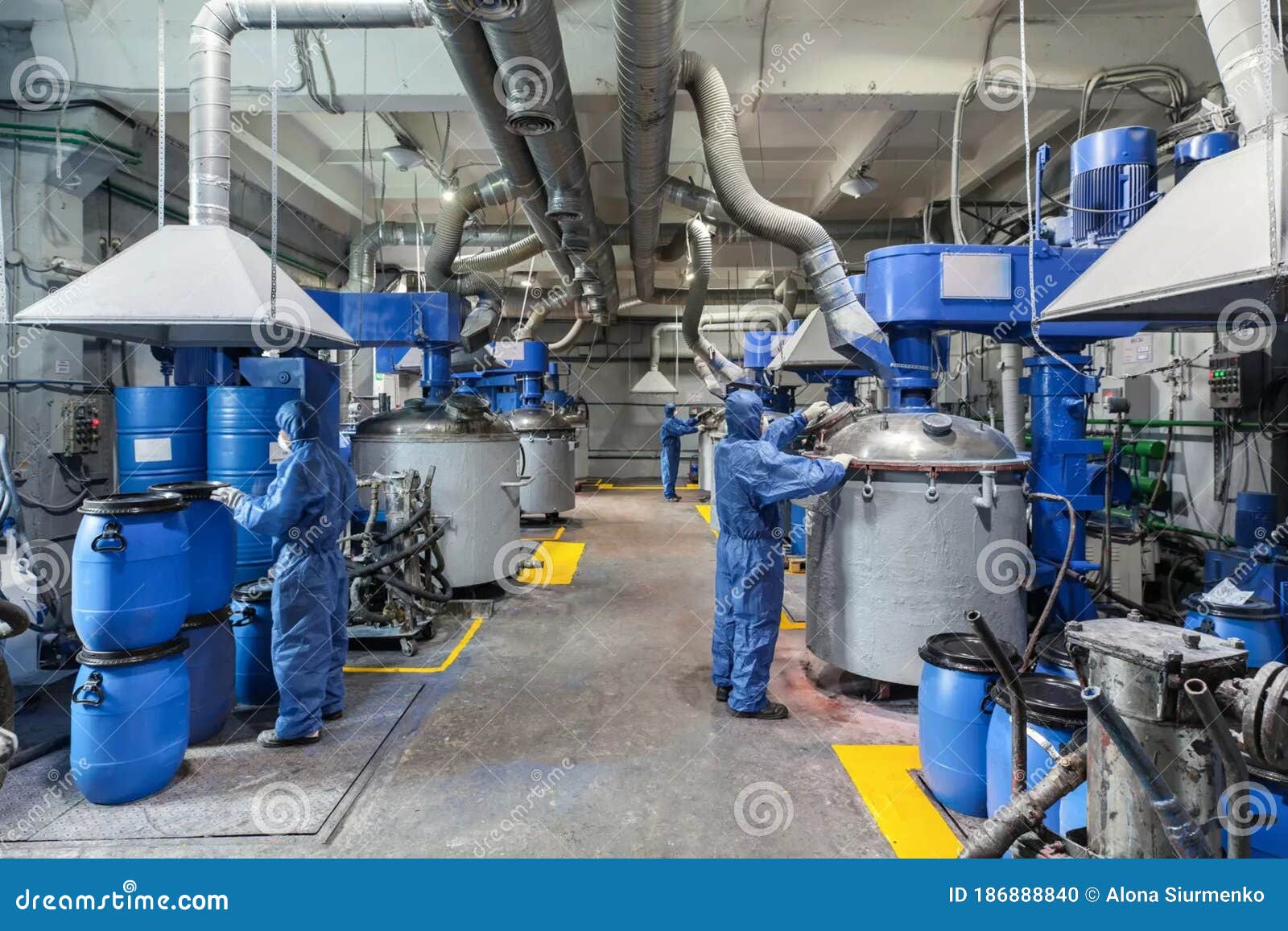 Workers Of Chemical Factory In Working Clothes Walks Near Large ...