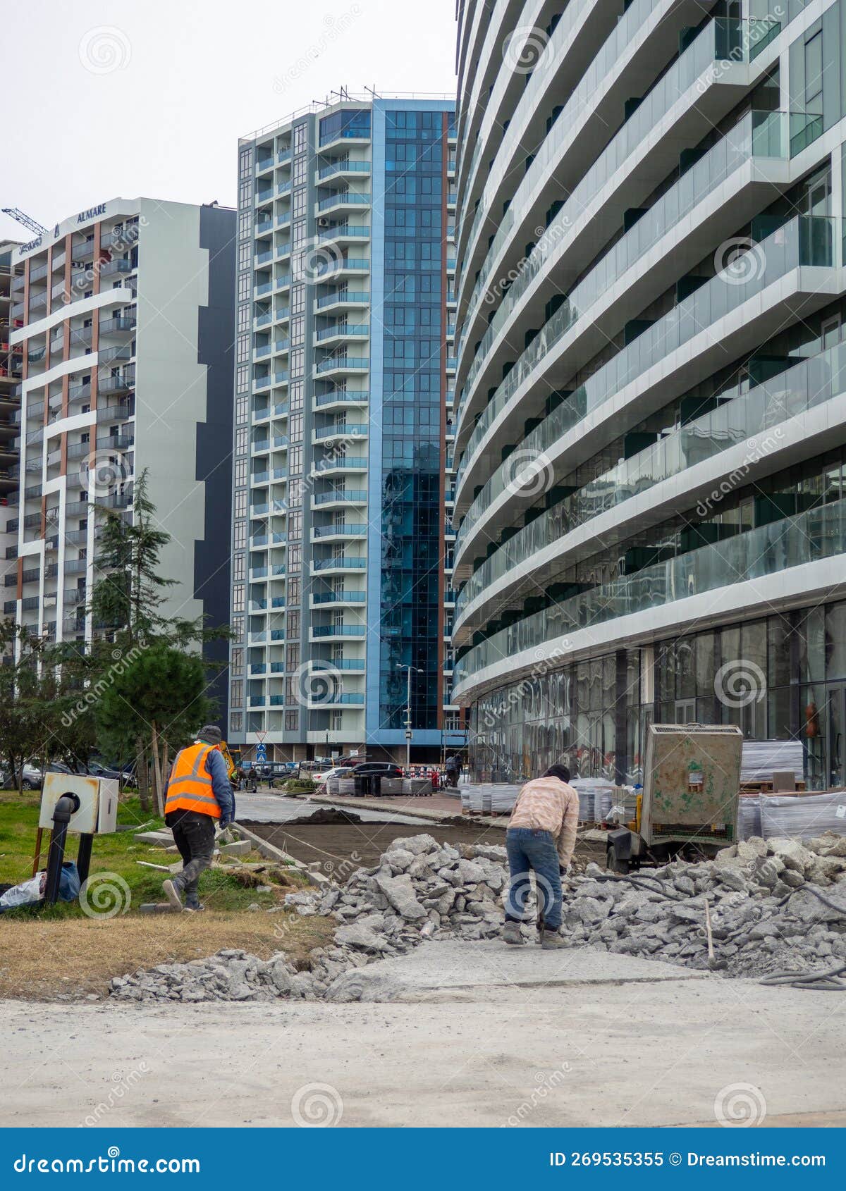 Workers Break Off Concrete. Hard Work. People are Reconstructing the ...