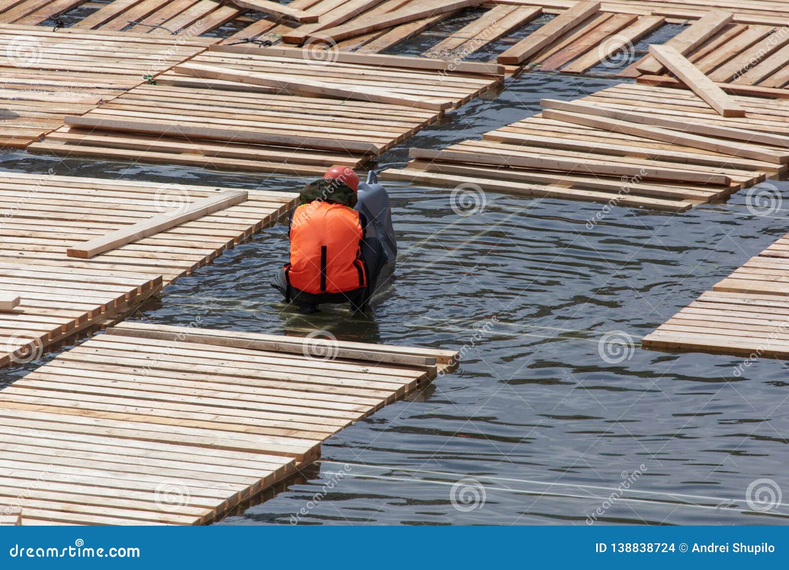 Workers Build a Dam of Wood on the River Stock Photo - Image of floats ...