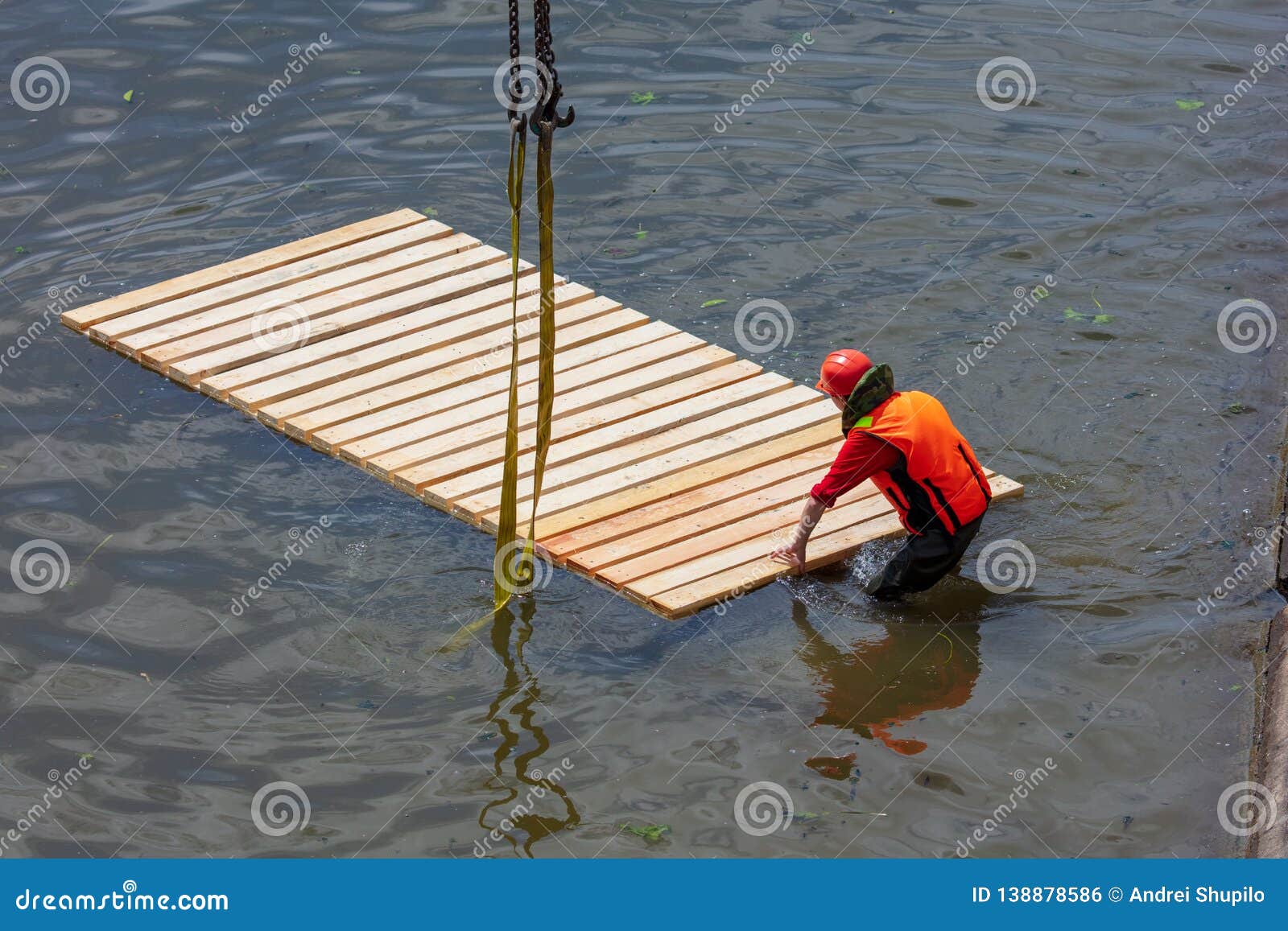 Workers Build a Dam of Wood on the River Stock Photo - Image of floats ...