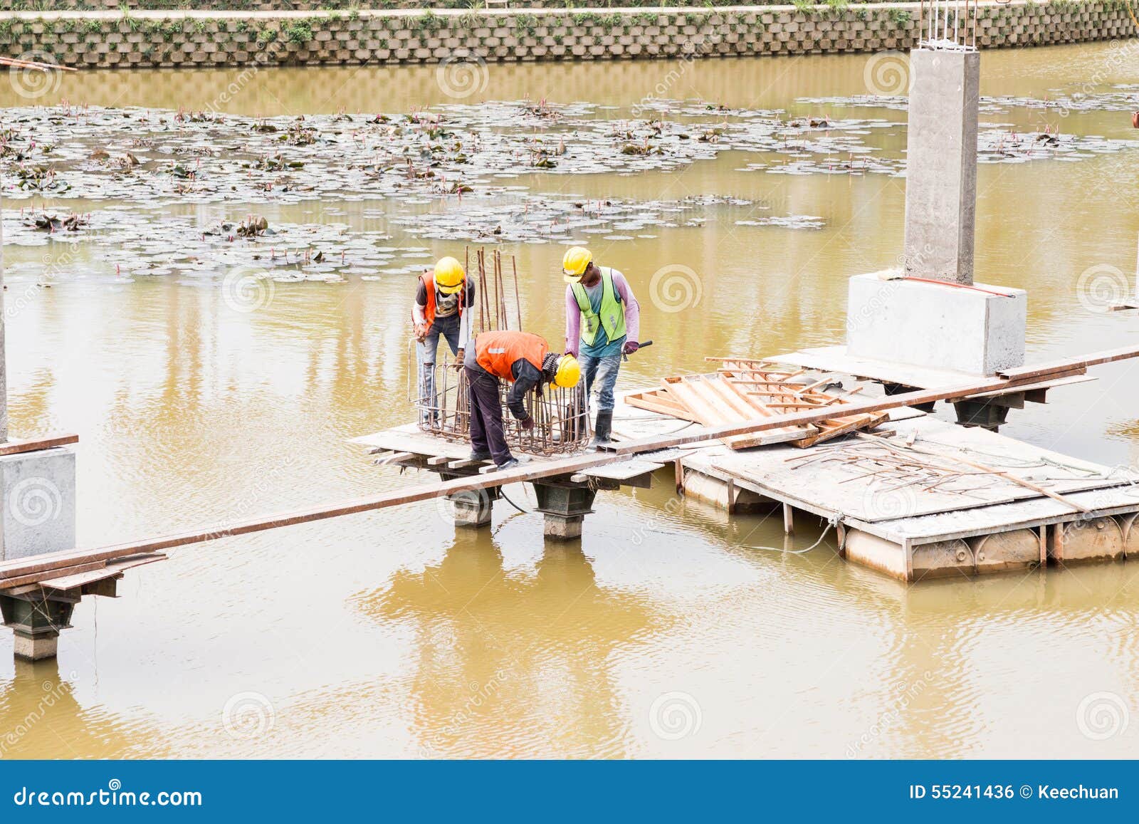 Workers Building Bridge Foundation Across Lake Stock Photography ...