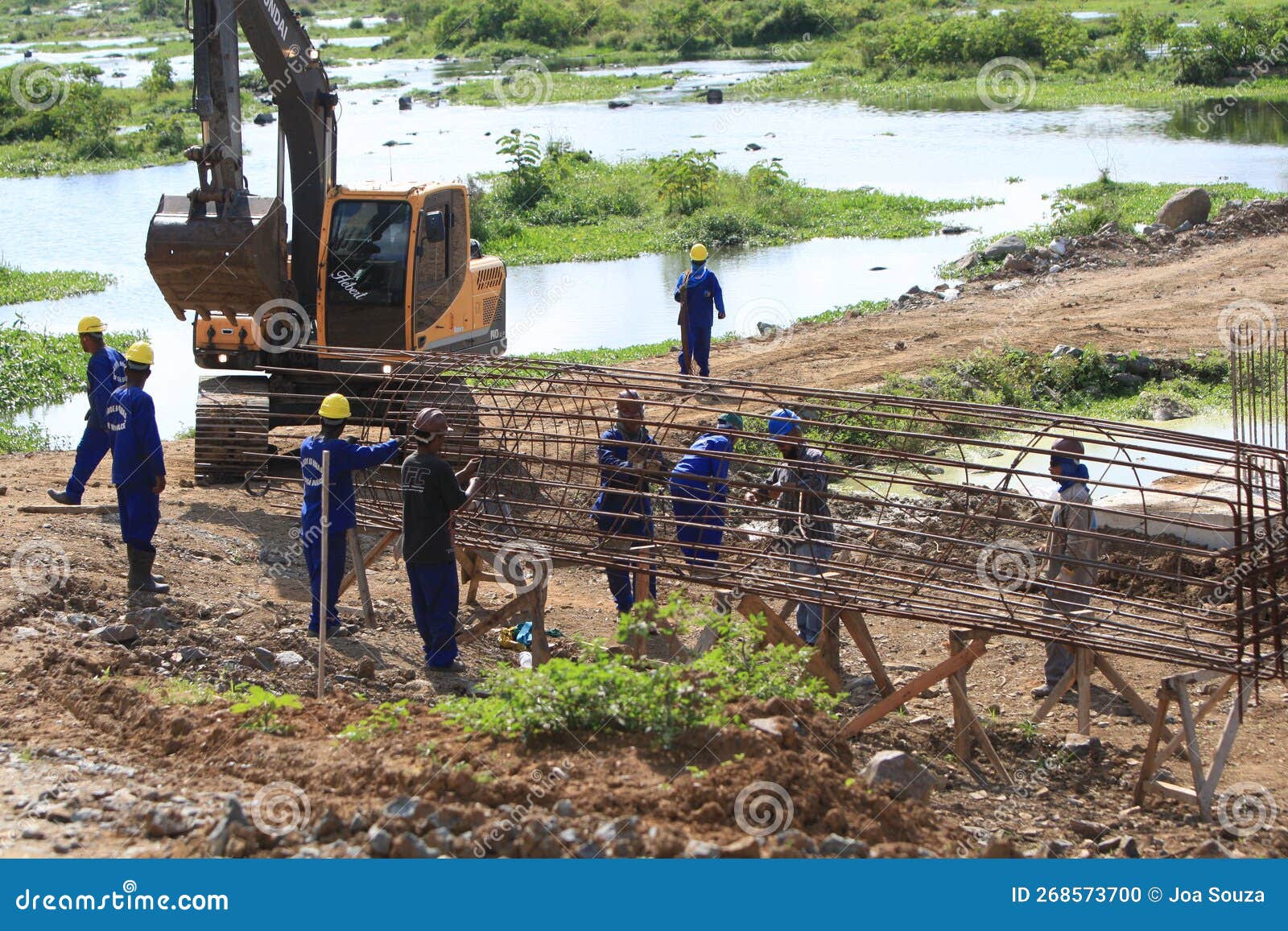 Workers building bridge editorial image. Image of asphalt - 268573700