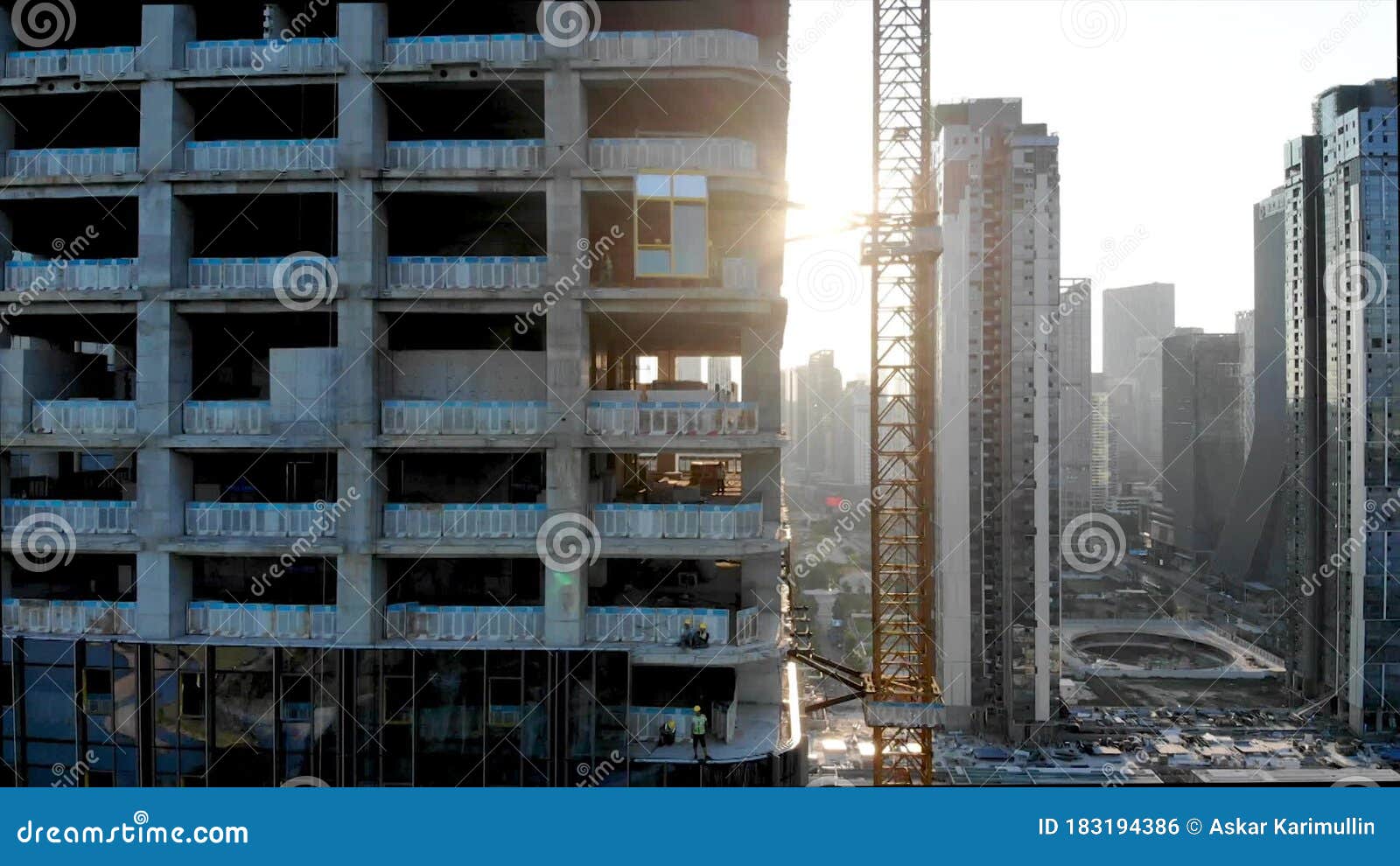 Workers are Installing the Precast Glass Panel for High Rise on the ...