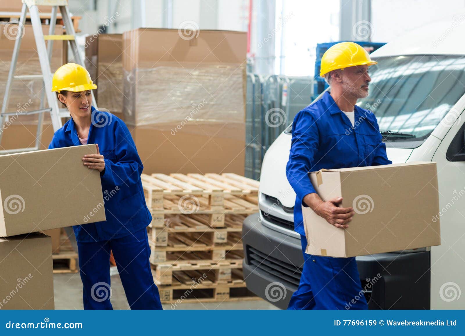 Workers carrying boxes stock image. Image of people, crate - 77696159