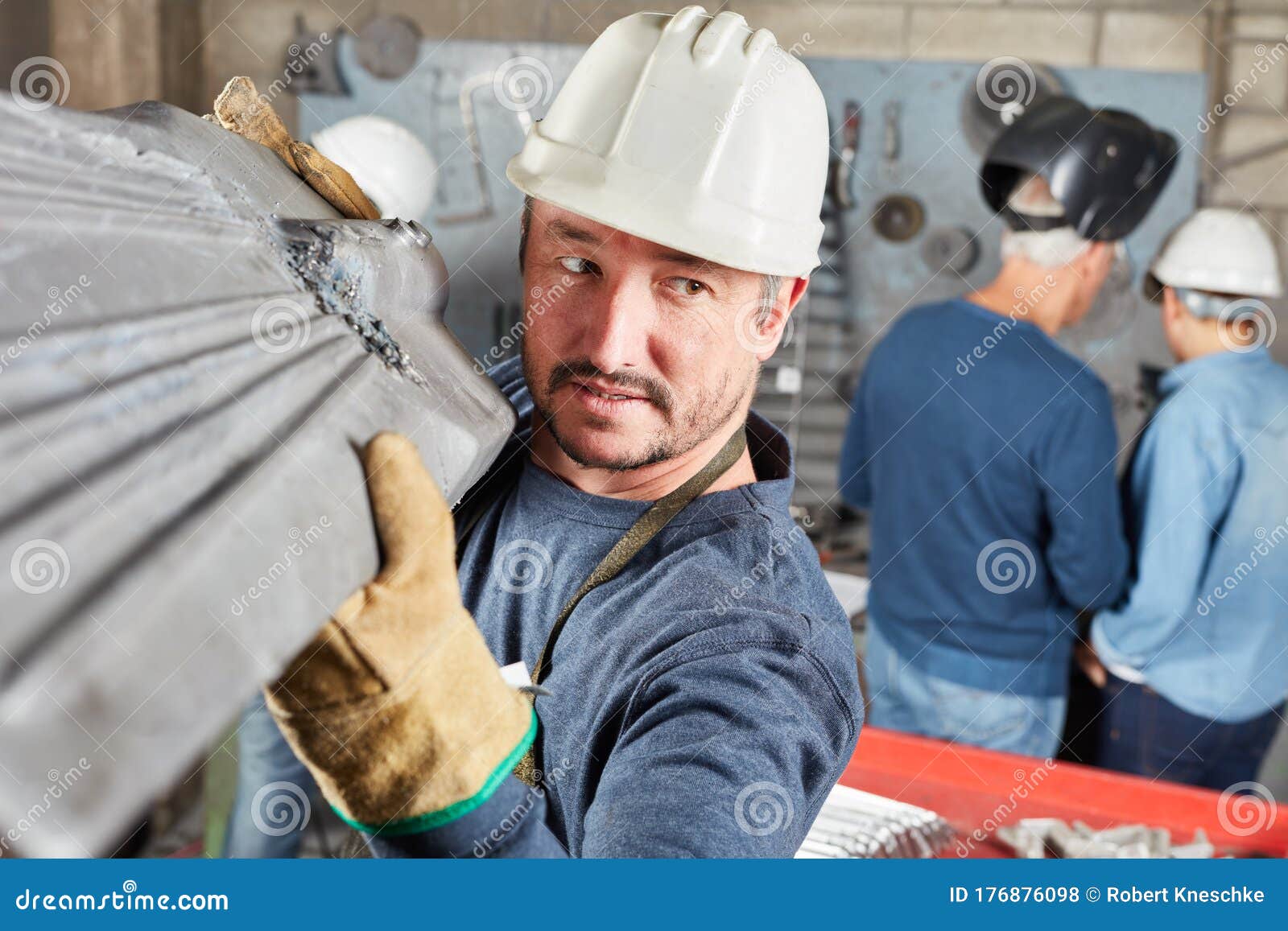 Workers Carrying Loads in Workshop Stock Photo - Image of factory ...