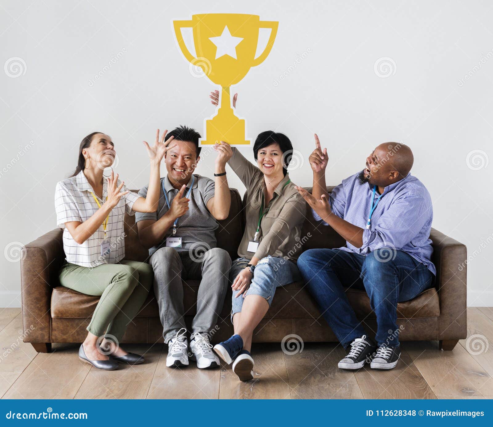 Workers Celebrating Their Success with a Trophy Stock Photo - Image of ...
