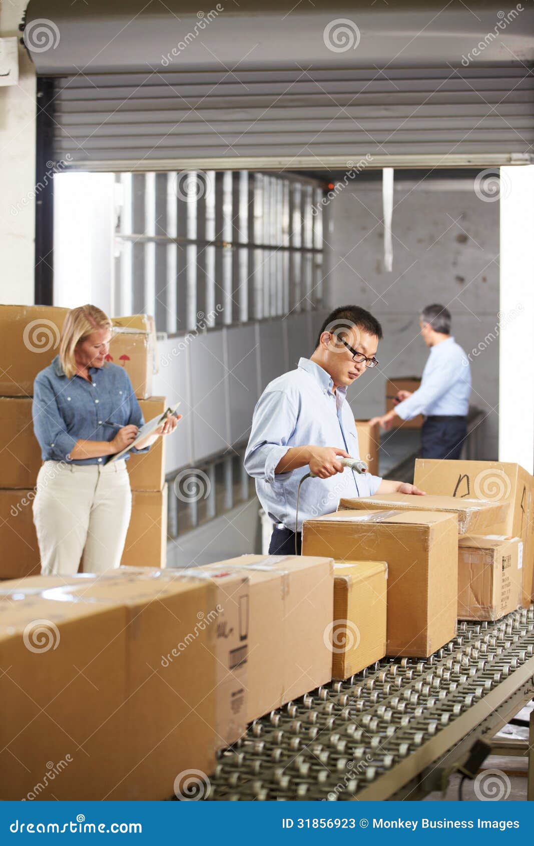Workers Checking Goods on Belt in Distribution Warehouse Stock Image ...
