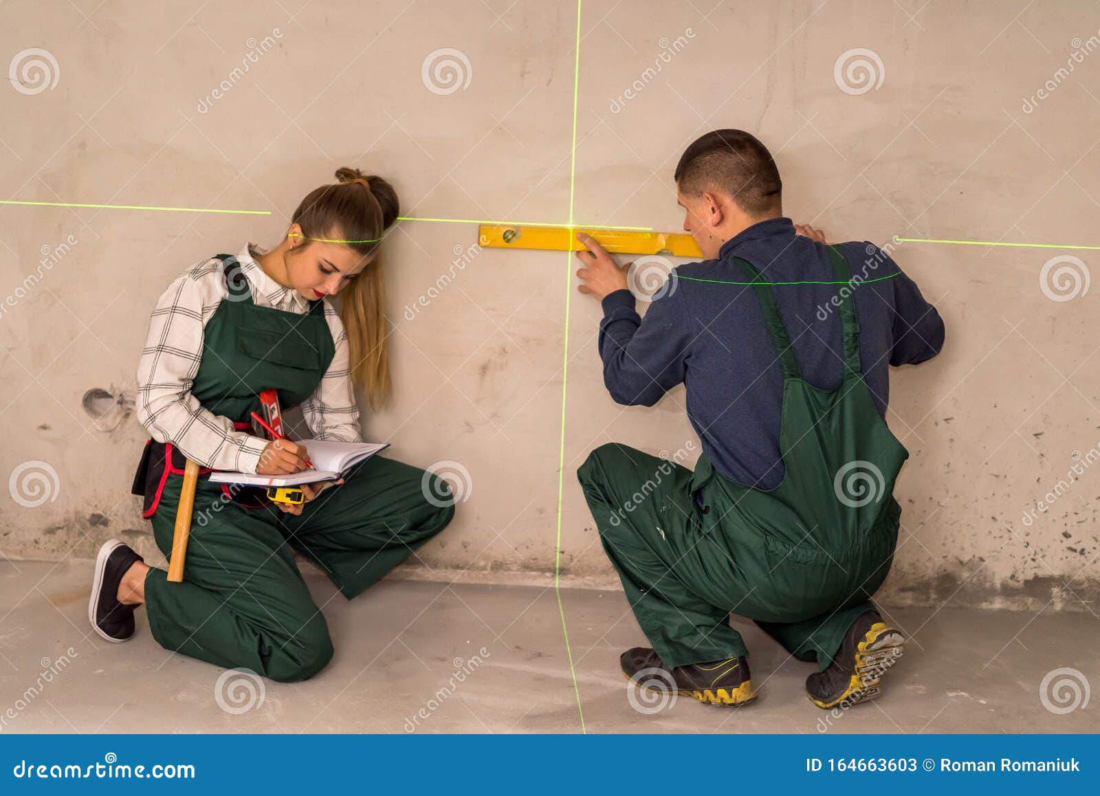 Workers Checking Walls with Laser Level Tool Stock Image - Image of ...