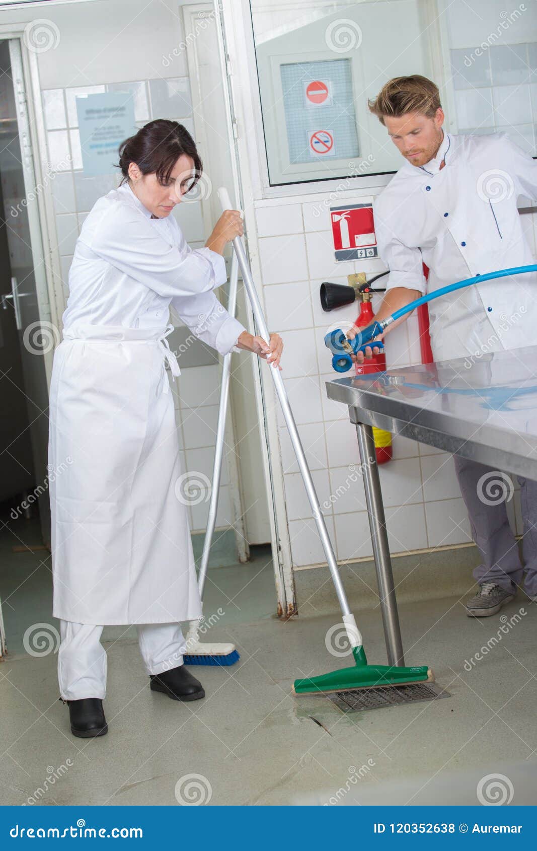 Workers Cleaning Kitchen Equipment Stock Photo - Image of professional ...
